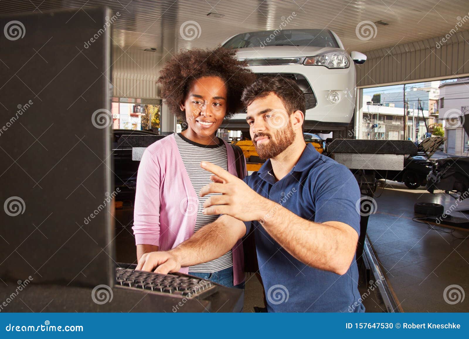 Mechatronics Technician Explains Customer Car Diagnostic Check Stock ...