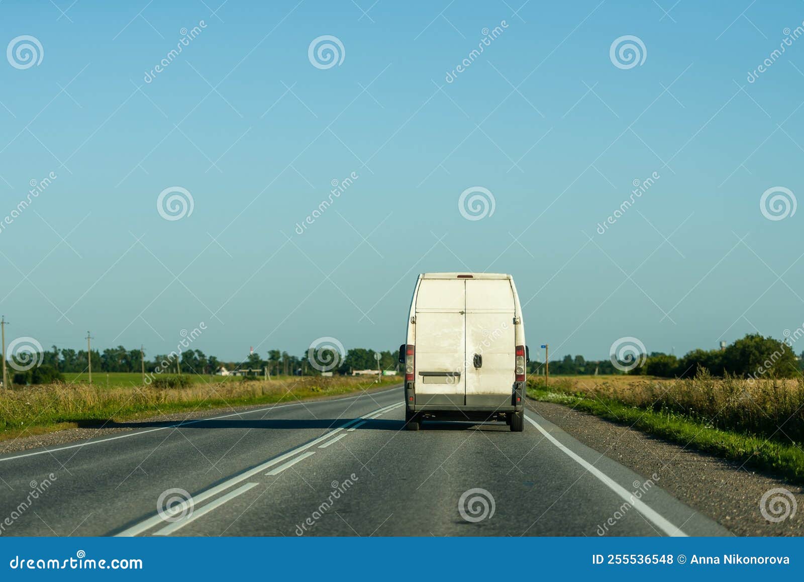 Car Minibus Driving on the Road Rear View. Stock Photo - Image of ...