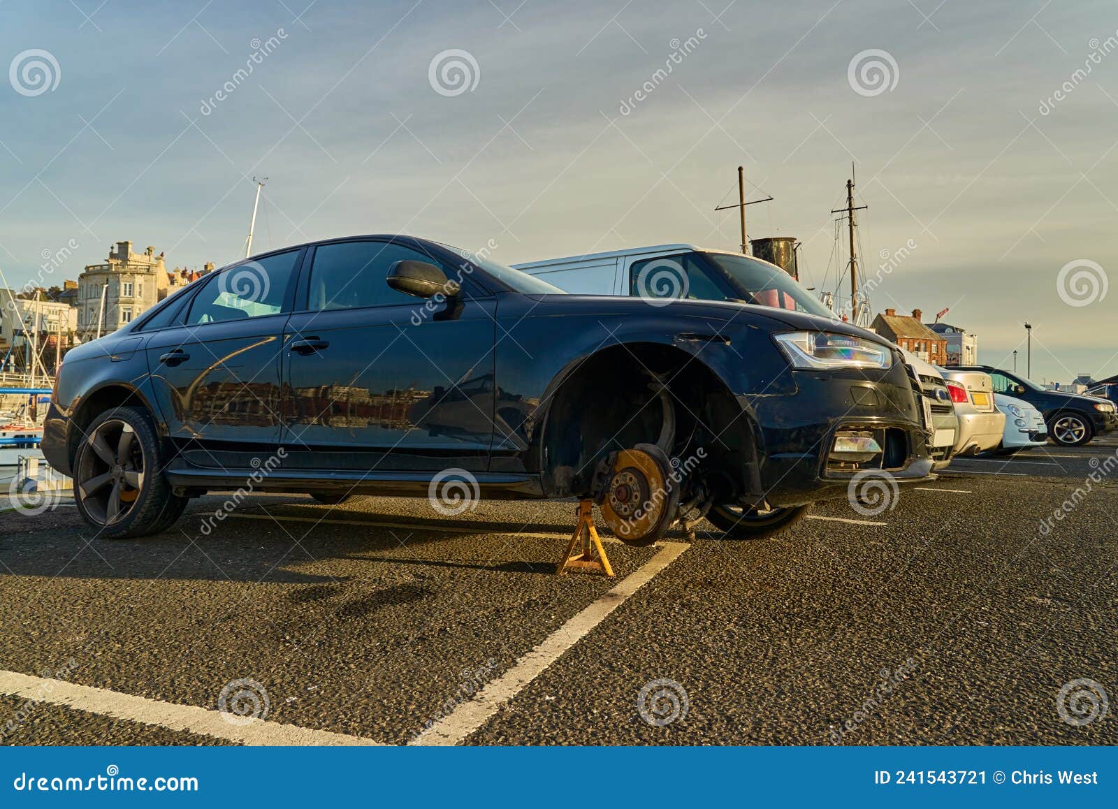 A Car Missing the Front Right Wheel Stock Image - Image of removed ...