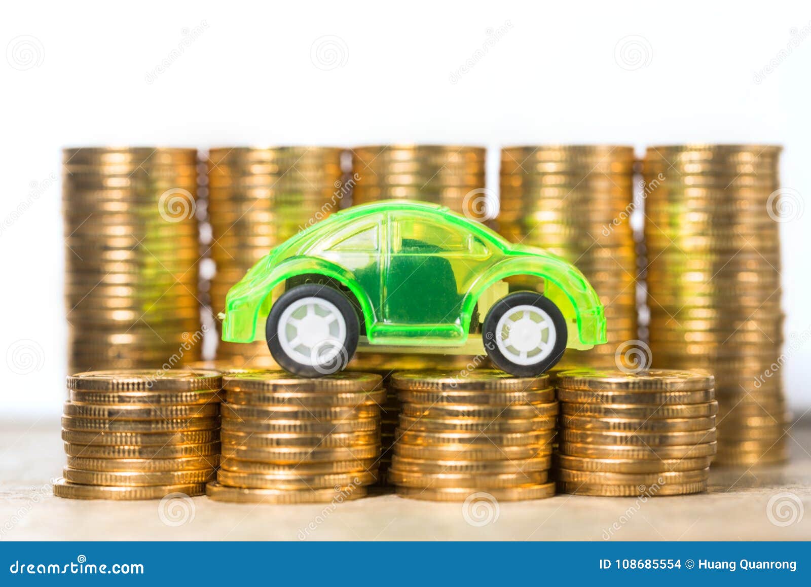 Car model with gold coins stock photo. Image of coins - 108685554