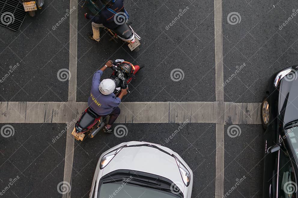 Car and Motorcycle at Intersection with Traffic Light Editorial Image ...