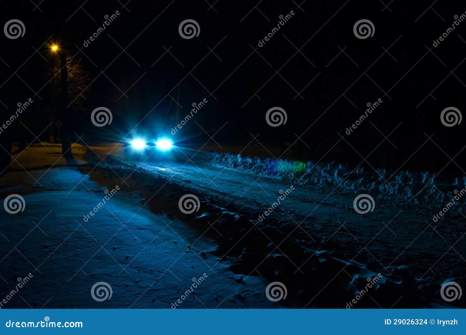 Car at Night on the Snow-covered Road Stock Photo - Image of city ...