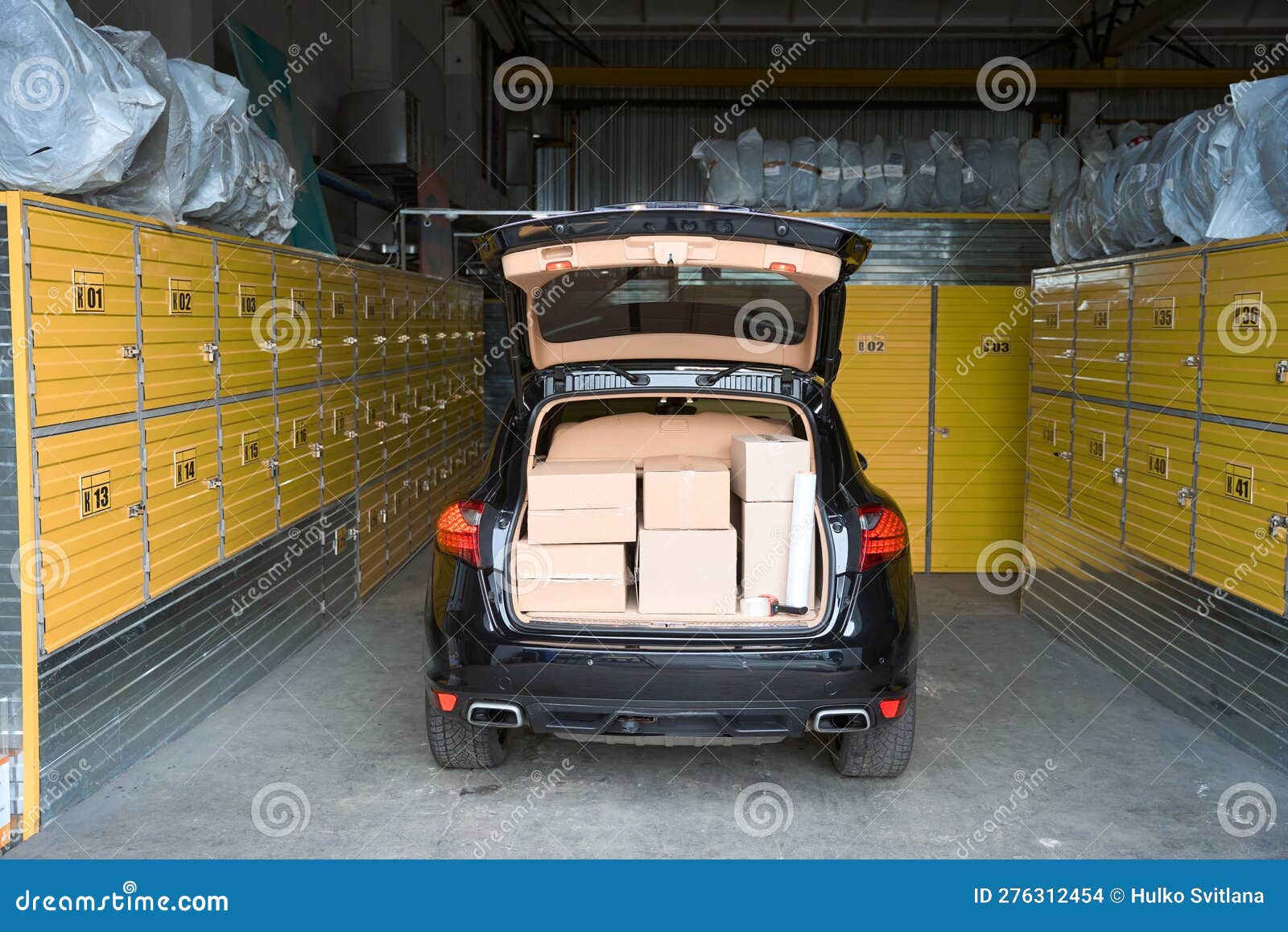 Car with an Open Trunk is in Storage Room Stock Photo - Image of ...