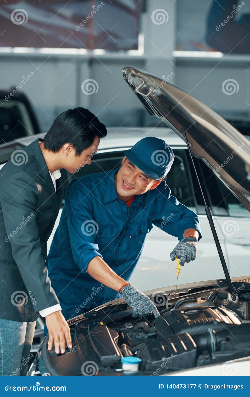 Car Owner and Mechanic at Workshop Stock Image - Image of discussion ...