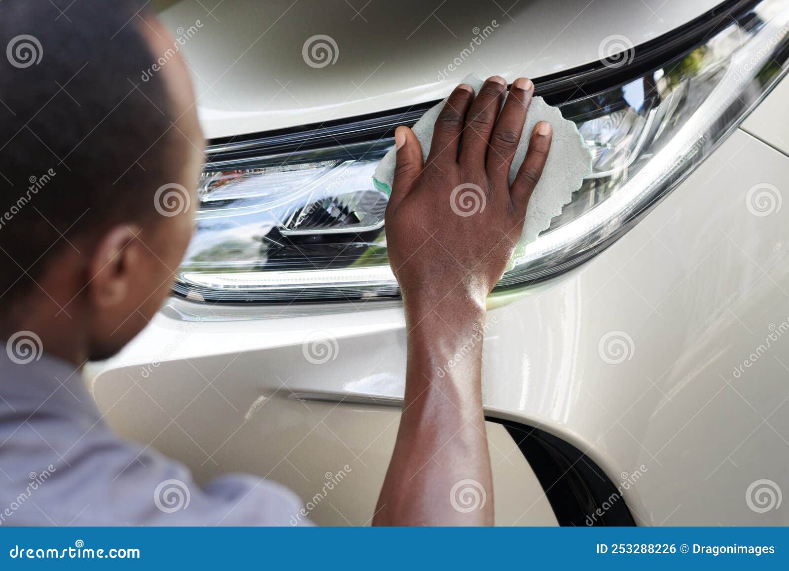 Car Owner Wiping Headlights Stock Photo - Image of clean, microfiber ...