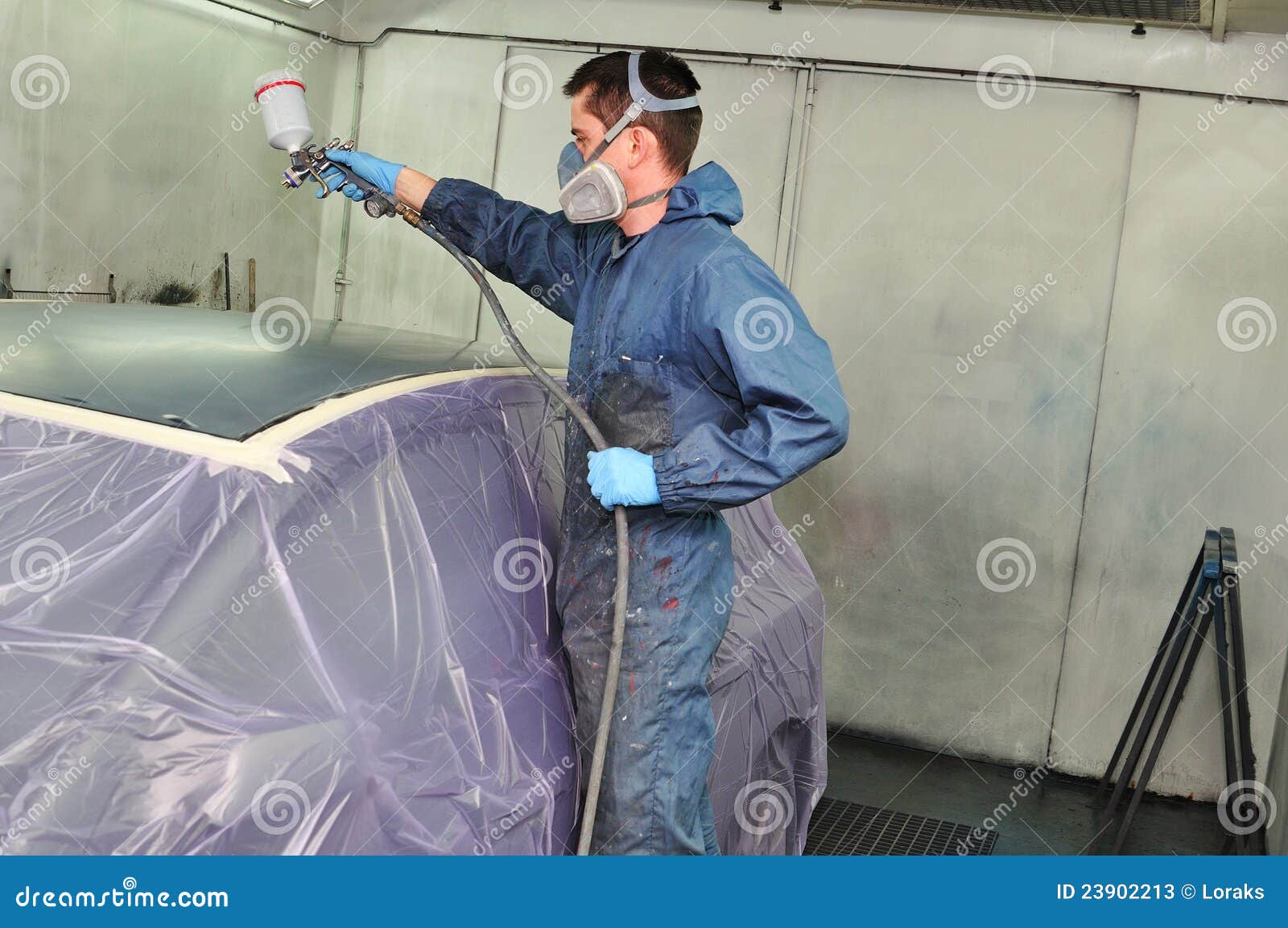 Car Painter at work. stock image. Image of garage, cover - 23902213
