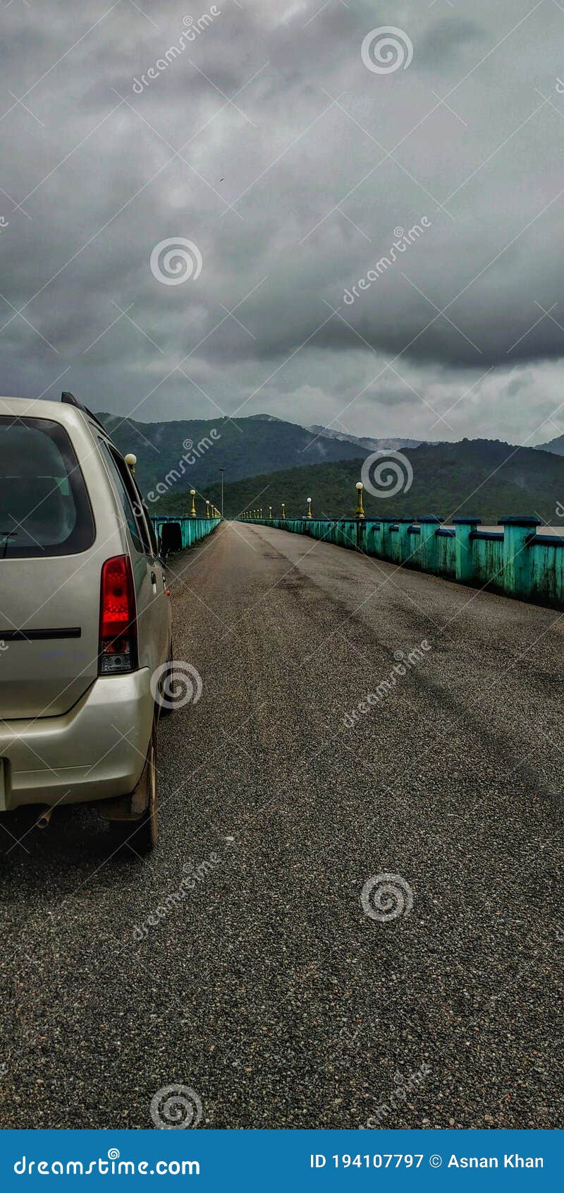 Car parked on a dam road stock image. Image of automotive - 194107797