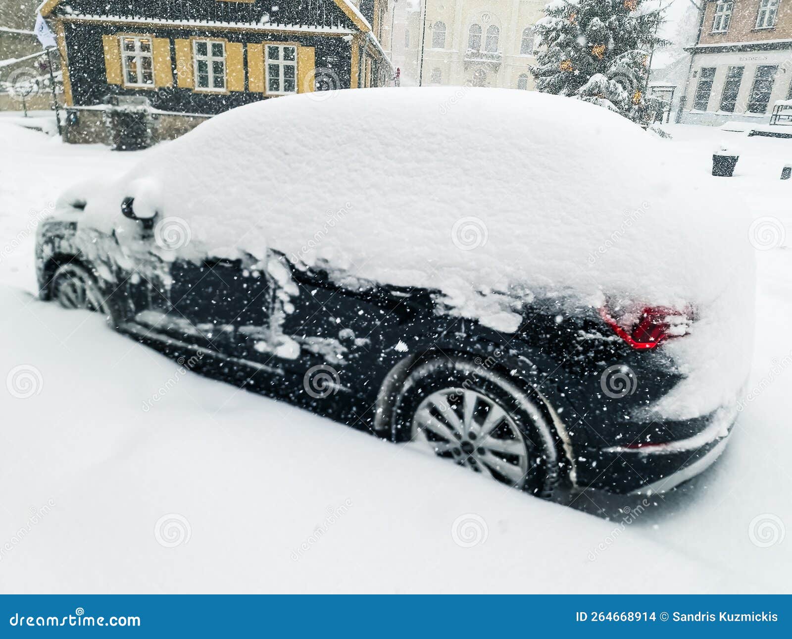 The Car in the Parking Lot is Completely Covered with Snow. Problems ...