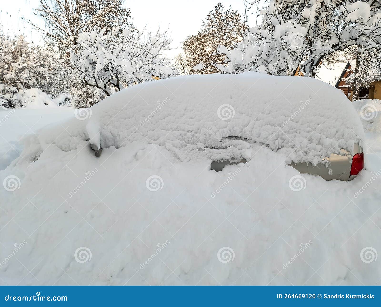 The Car in the Parking Lot is Completely Covered with Snow. Problems ...