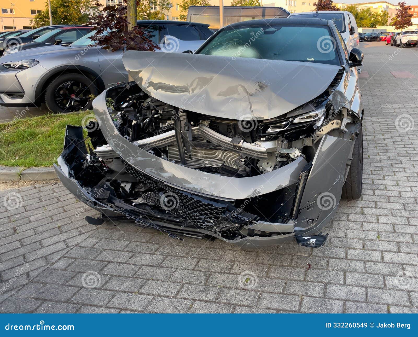 A Car is in a Parking Lot with a Smashed Front End Stock Image - Image ...