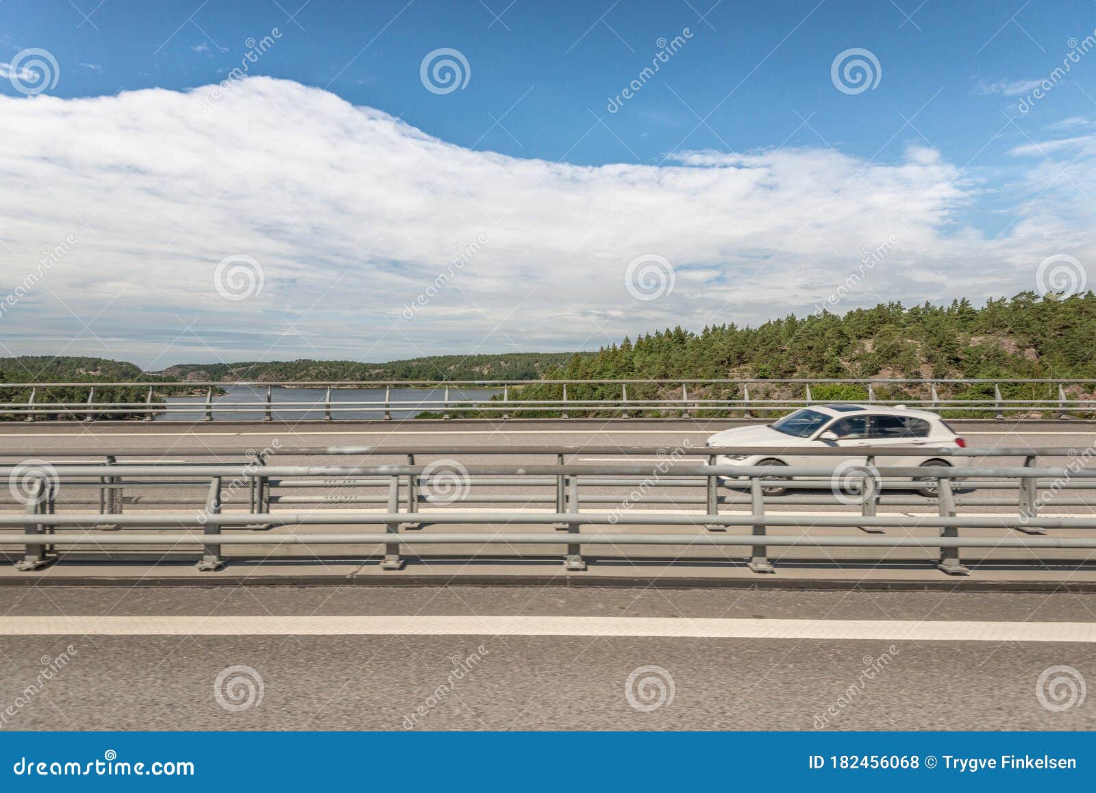 Car passing on a bridge stock photo. Image of freeway - 182456068