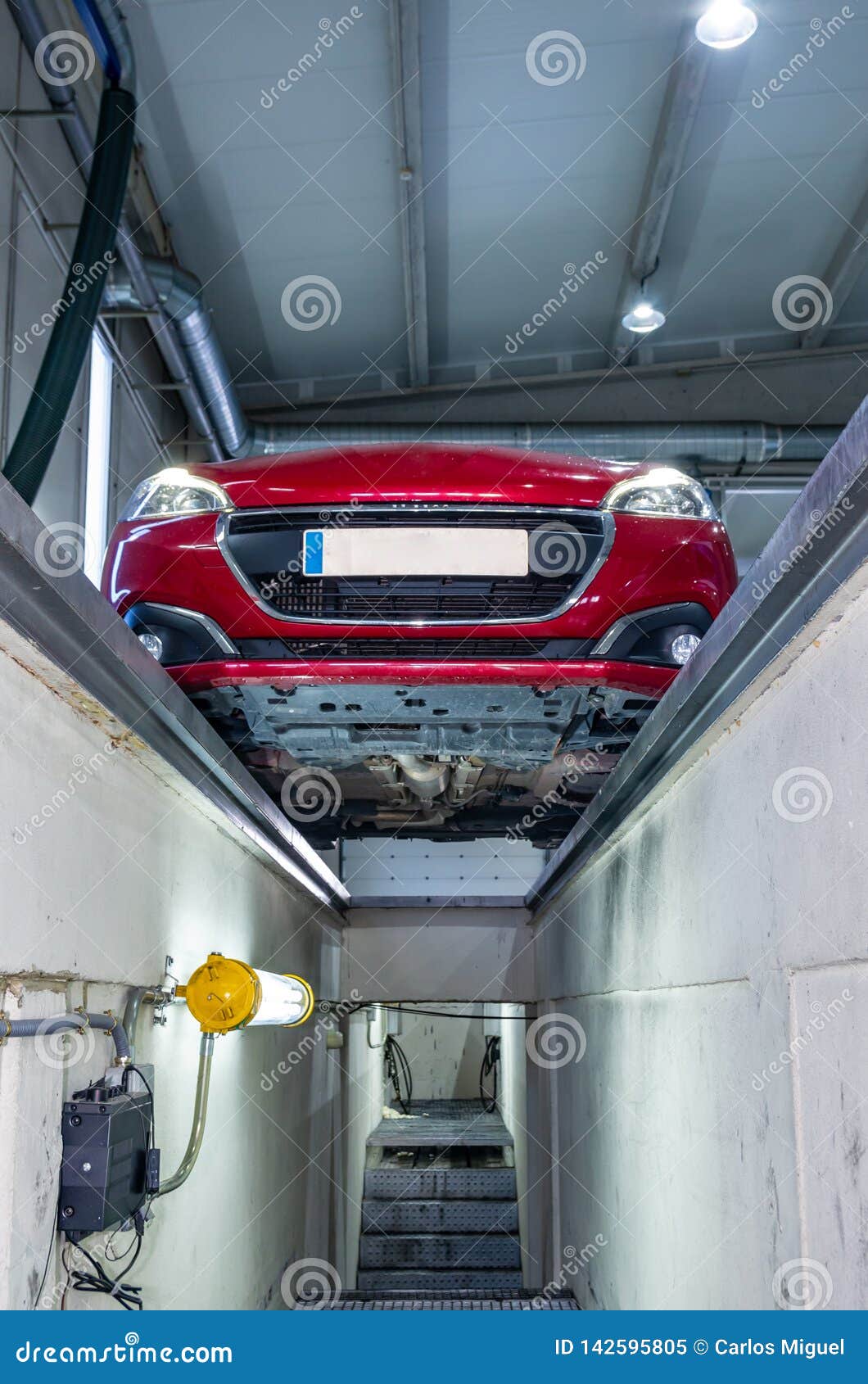 Car Passing Over the Inspection Pit Stock Image - Image of center ...