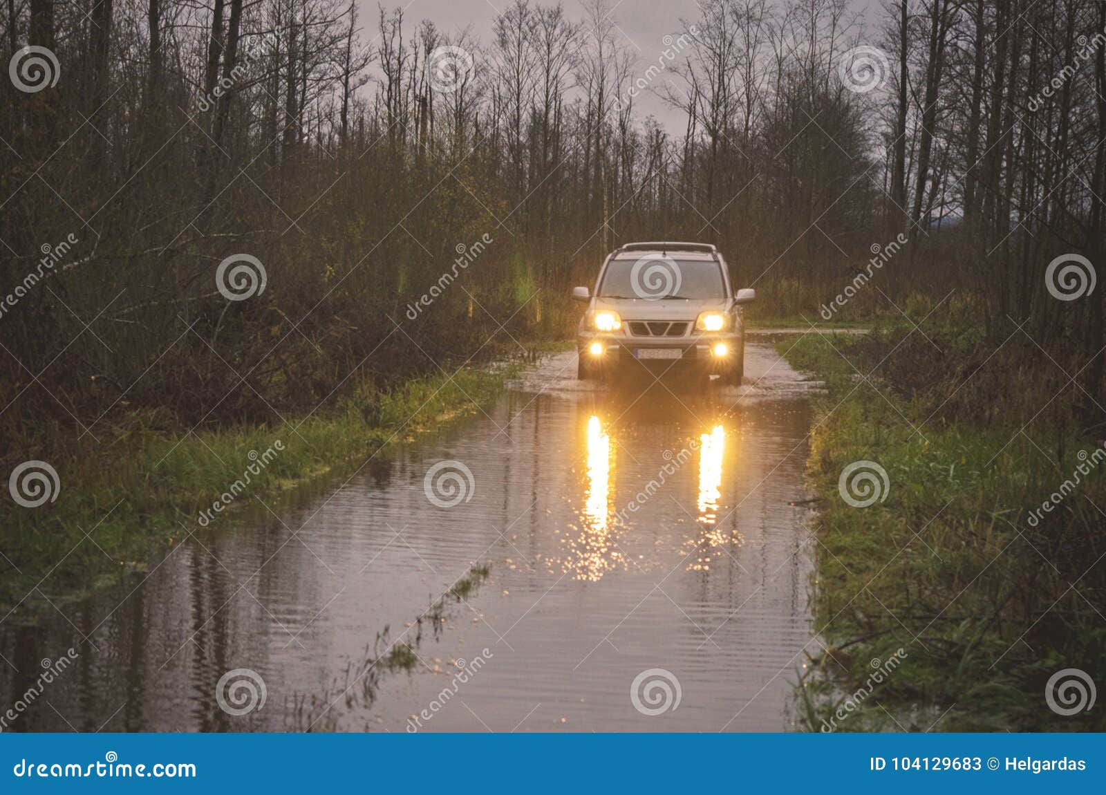 Car passing through water stock image. Image of passing - 104129683