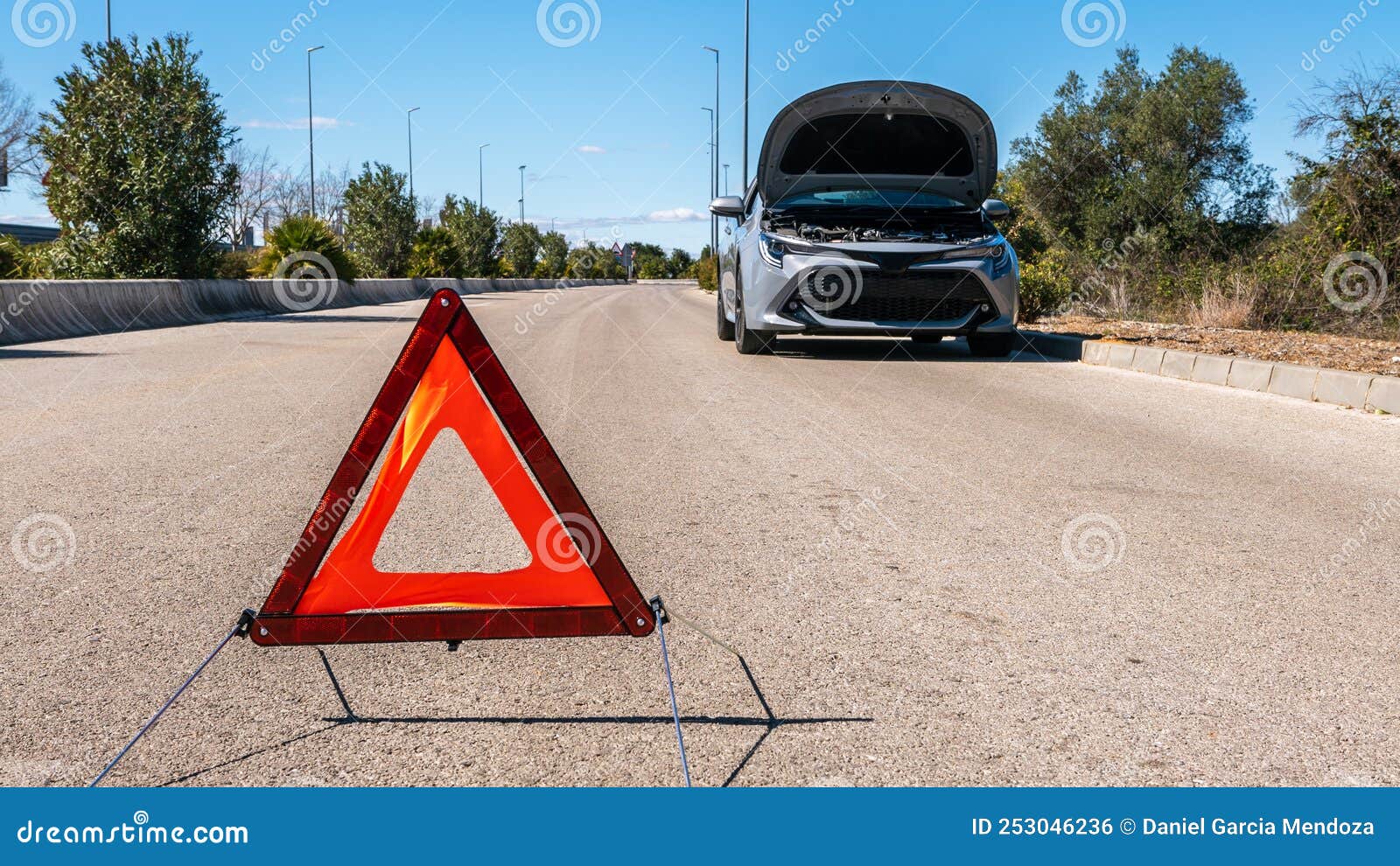 Car with Problems and a Red Triangle To Warn Other Road Users. a Broken ...