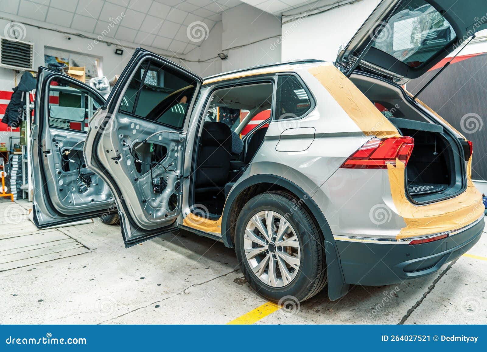 Car in Process of Installing Noise Insulation, Disassembled Doors ...