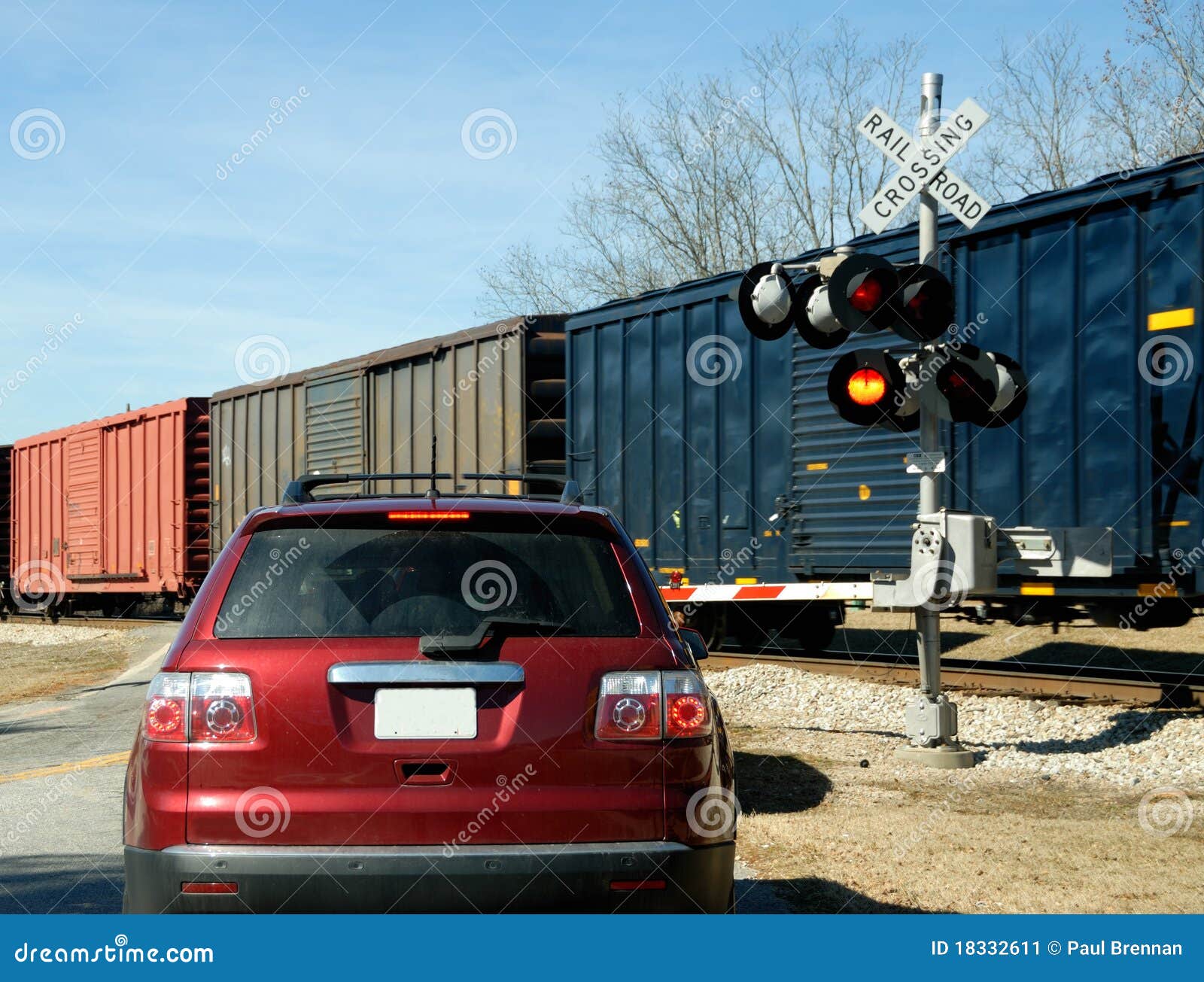 Car at railroad crossing stock image. Image of passing - 18332611