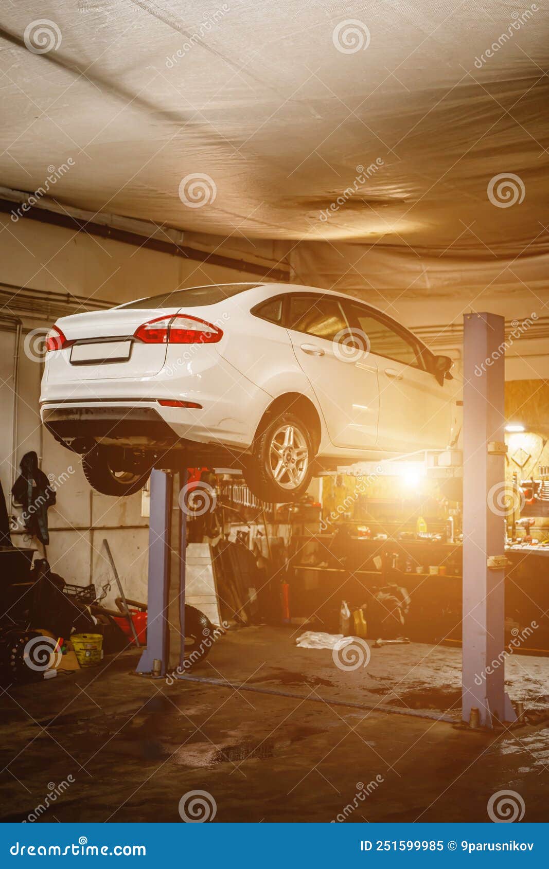 Car Raised on Car Lift at Auto Repair Service Stock Image - Image of ...