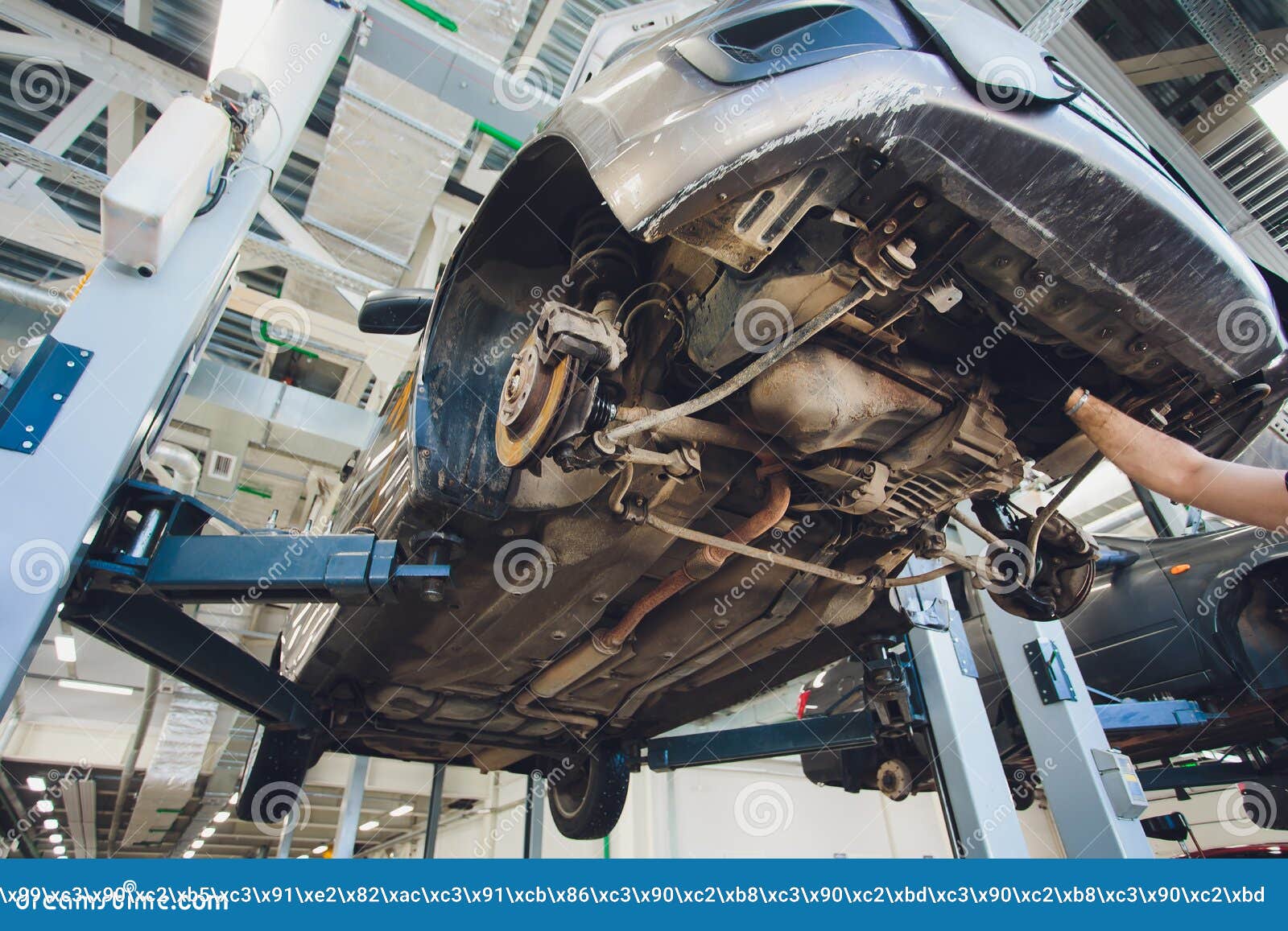 Car Raised on Car Lift in Autoservice. Stock Photo - Image of centre ...