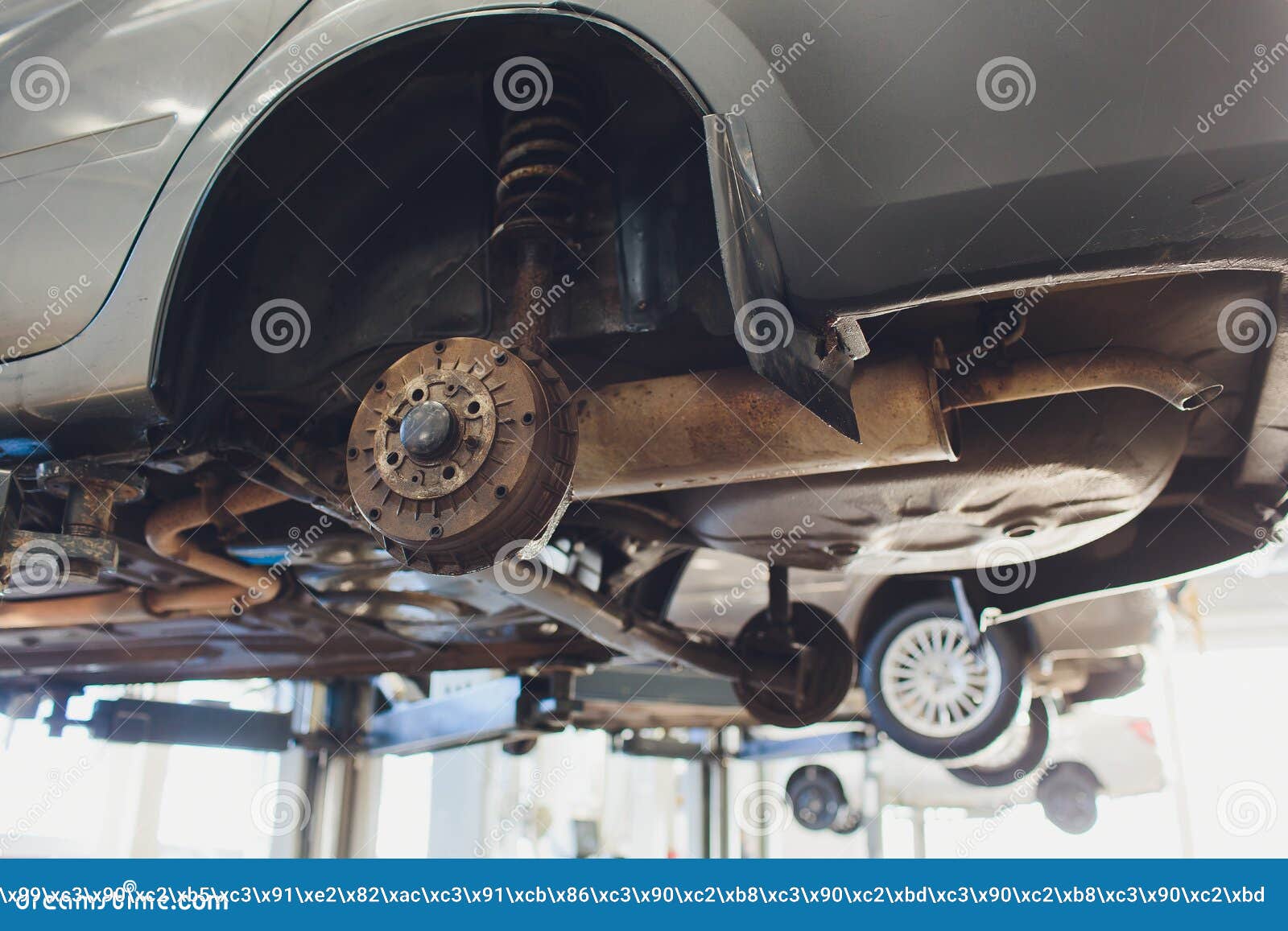 Car Raised on Car Lift in Autoservice. Stock Photo - Image of indoor ...
