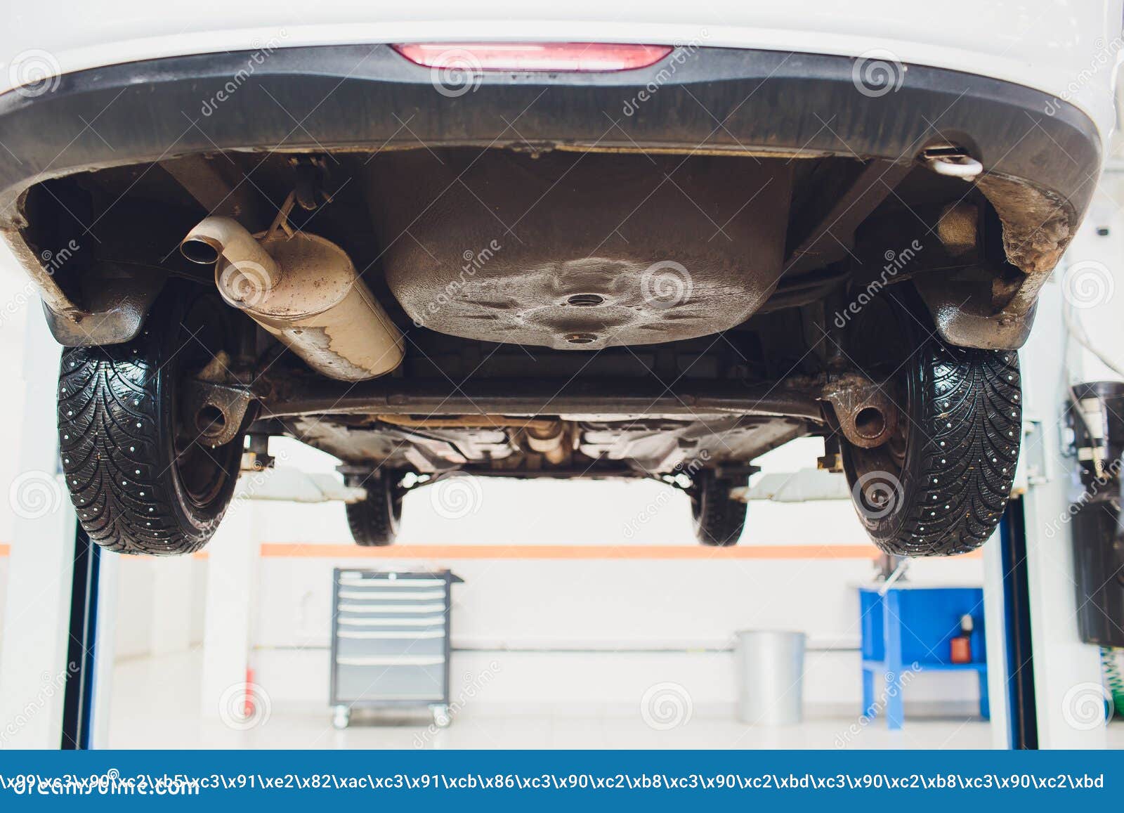 Car Raised on Car Lift in Autoservice Stock Image - Image of centre ...