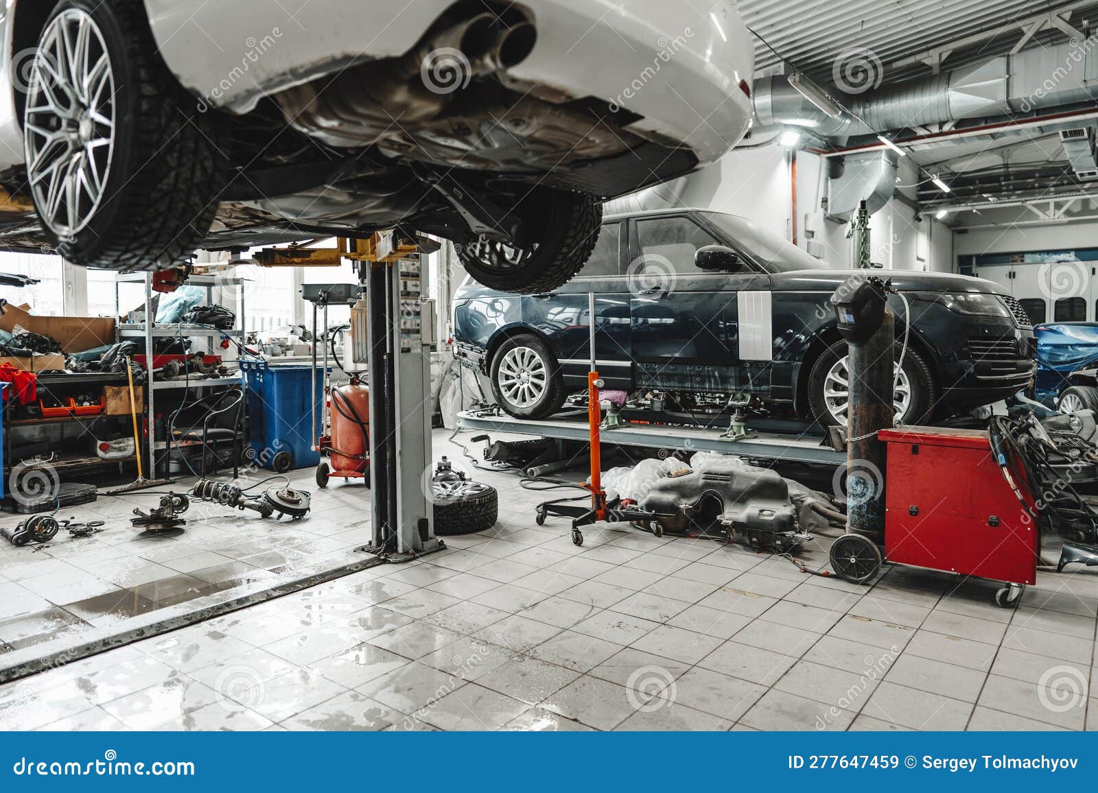 Car Raised on Car Lift in Car Service Shop Stock Image - Image of ...