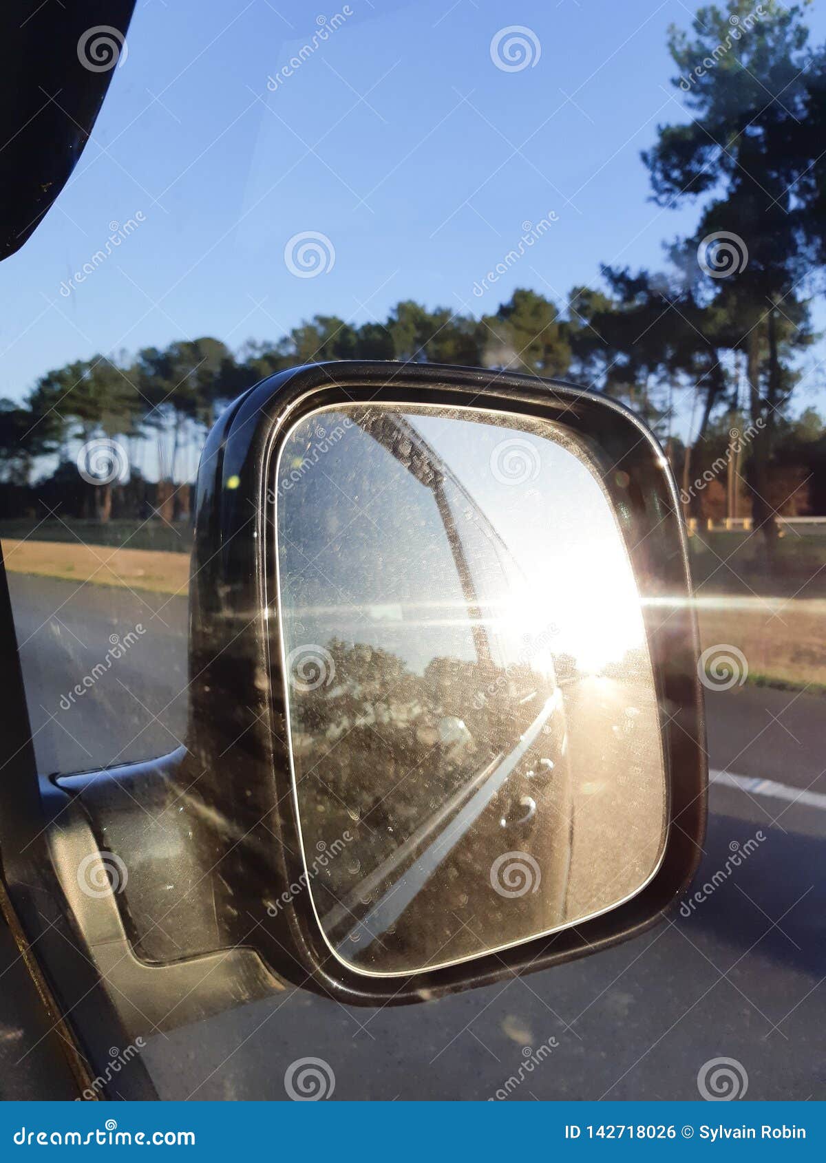 Car Rear View Mirror with Summer Sun and Sunset Reflecting Stock Photo ...