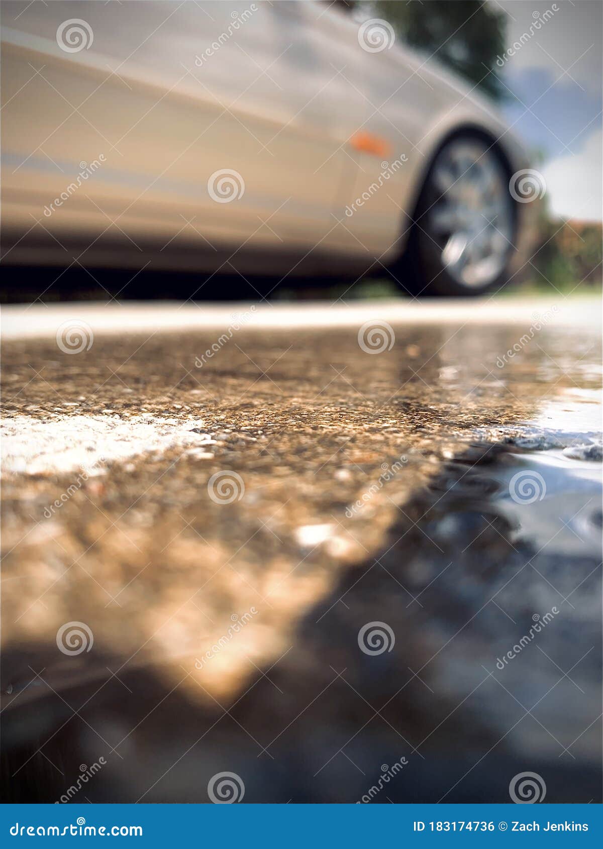 Car with Reflection Puddle in Driveway Stock Photo - Image of ...