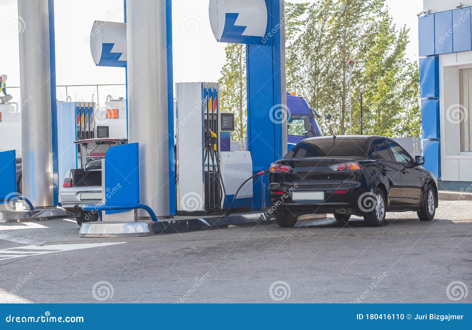 Car Refueling at a Gas Station Stock Photo - Image of sign, refueling ...