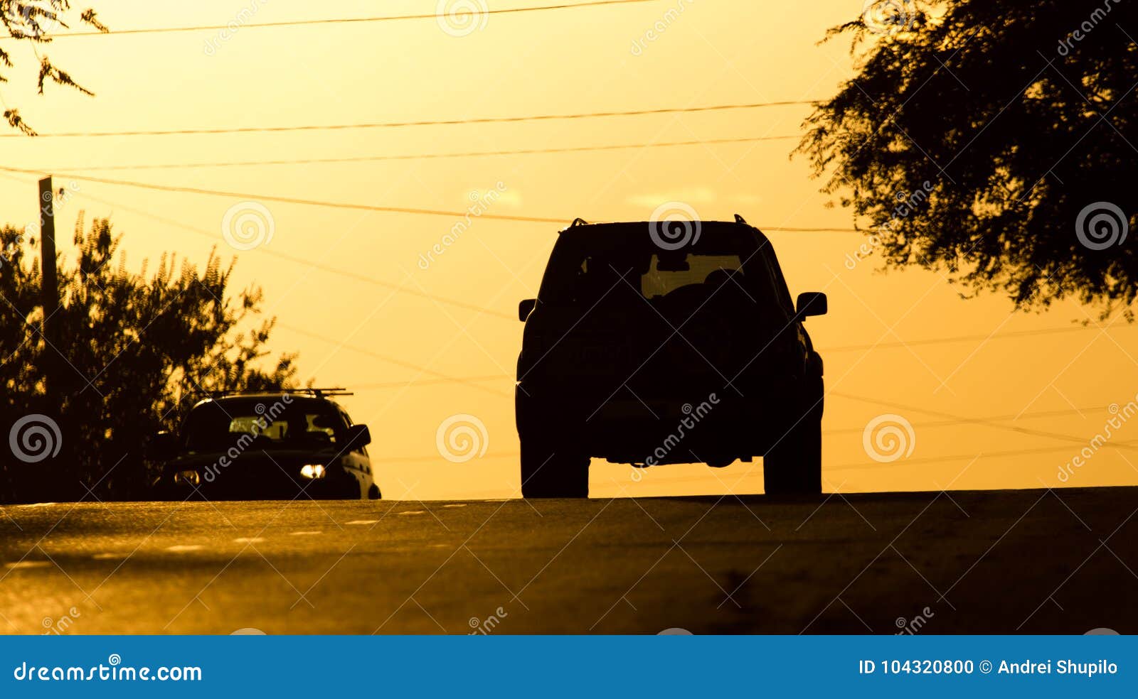 Car Rides on the Road at Sunset Stock Photo - Image of sundown, desert ...