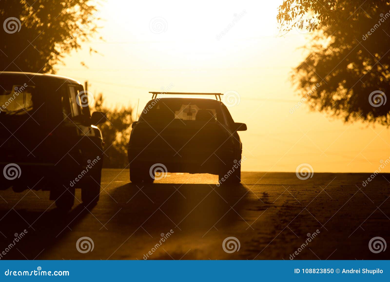 Car Rides on the Road at Sunset Stock Photo - Image of night, desert ...
