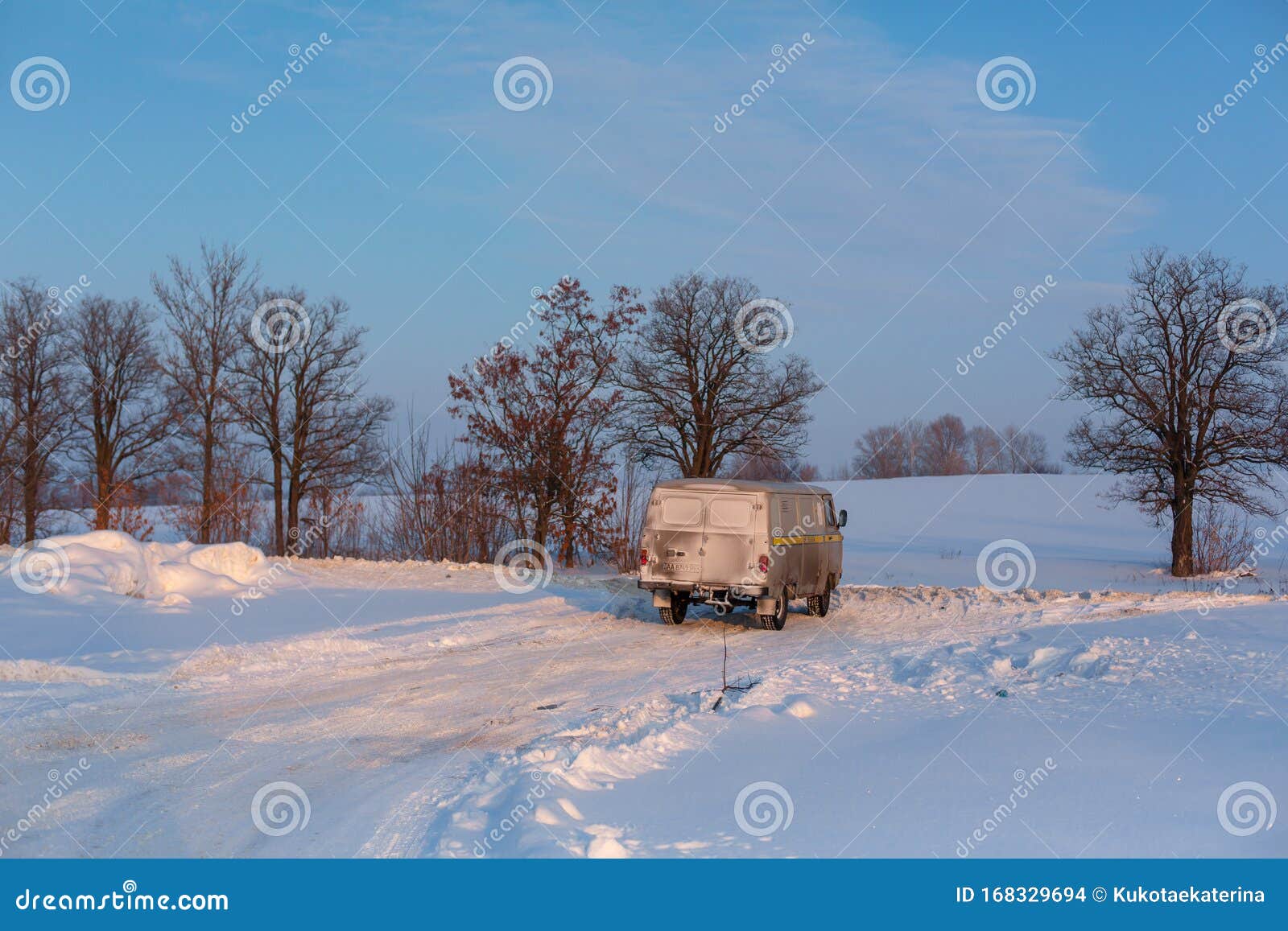 The Car Rides on a Snowy Highway. Difficult Weather Conditions Stock ...