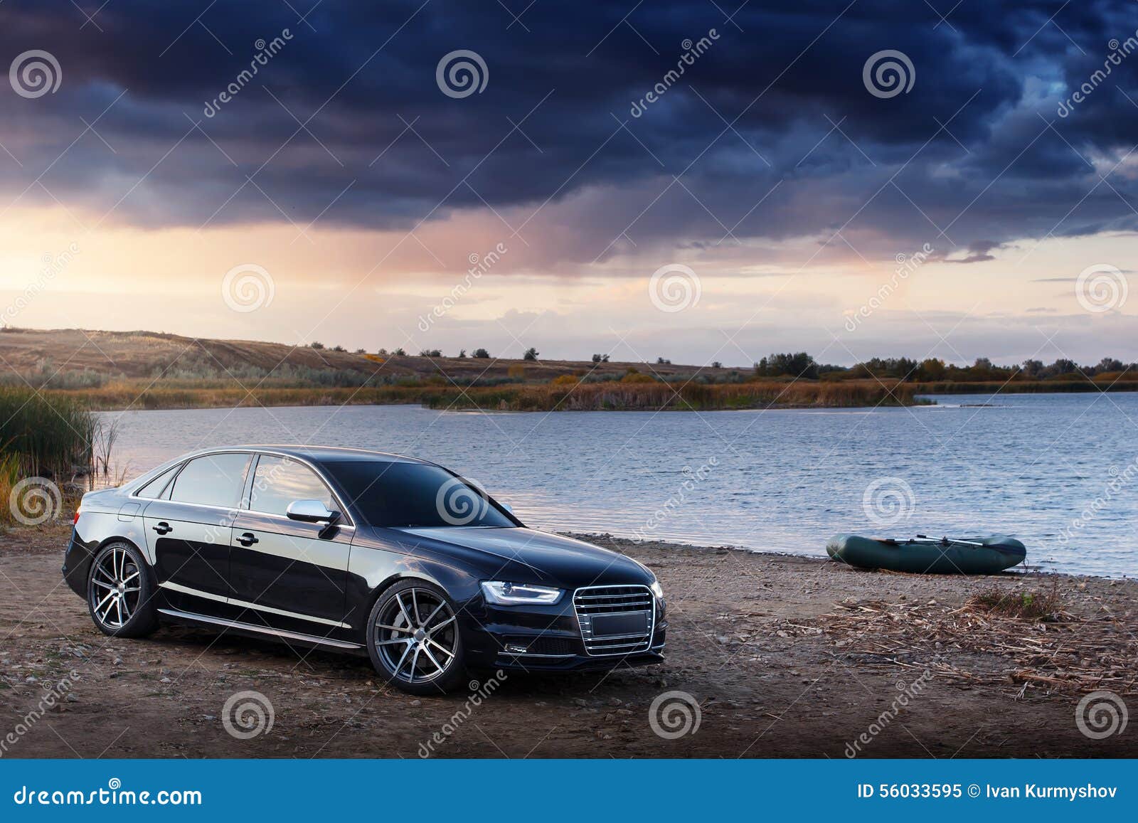 Car Near River and Boat at Sunset Summertime Audi Stock Image - Image ...