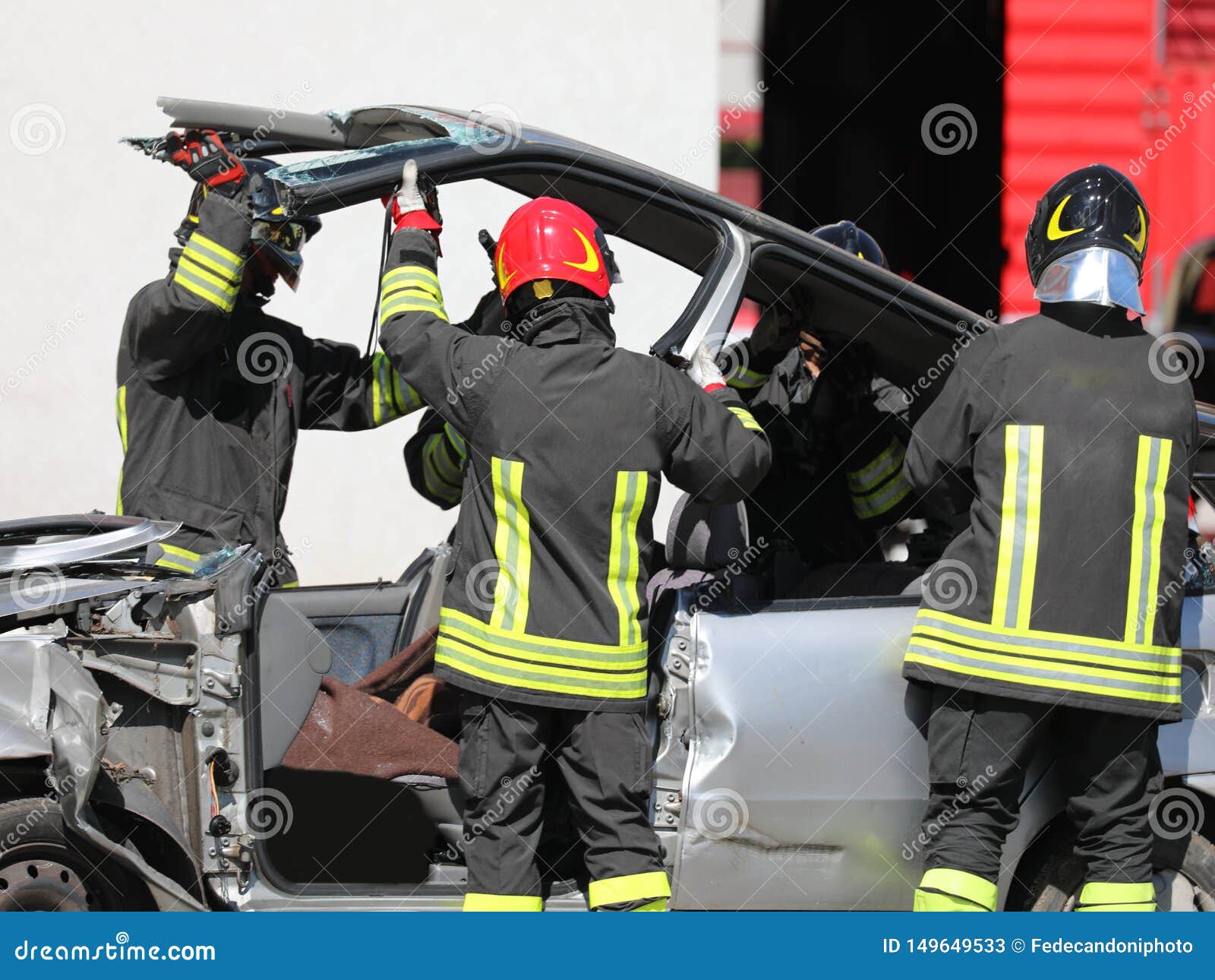 Car after Road Accident and the Firemen in Action Stock Image - Image ...