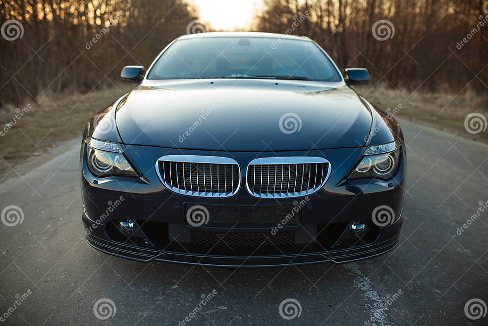 Car on road, front side stock photo. Image of village - 56500130