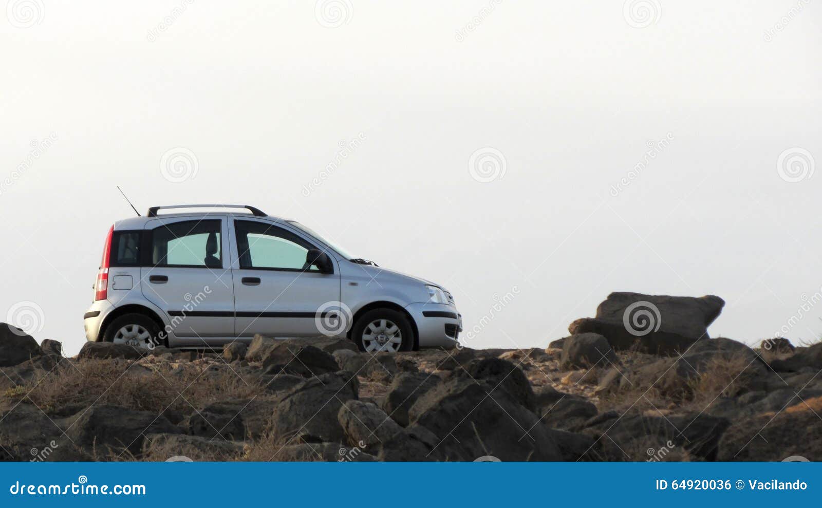 Car on rocks stock photo. Image of sunrise, isolated - 64920036