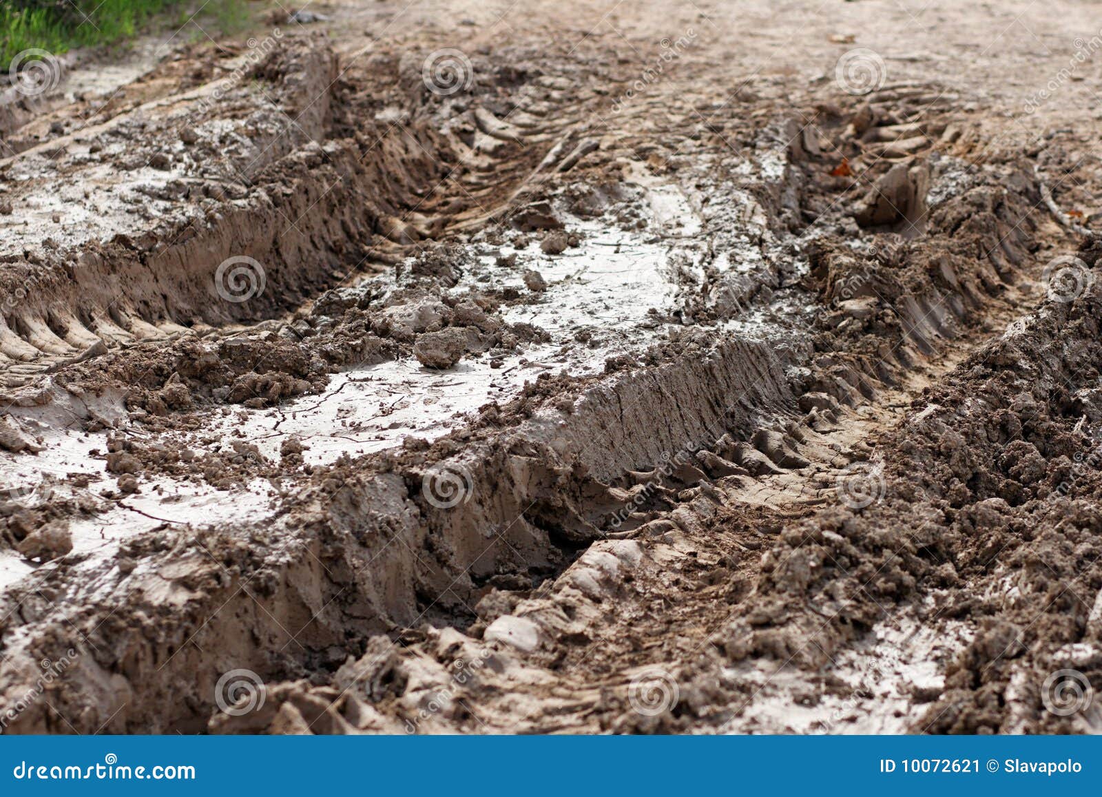 Car ruts in dry road mud stock image. Image of texture - 10072621