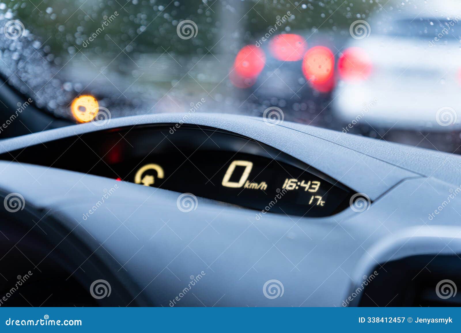 A Car S Dashboard Features a Speedometer Reading Zero while Displaying ...