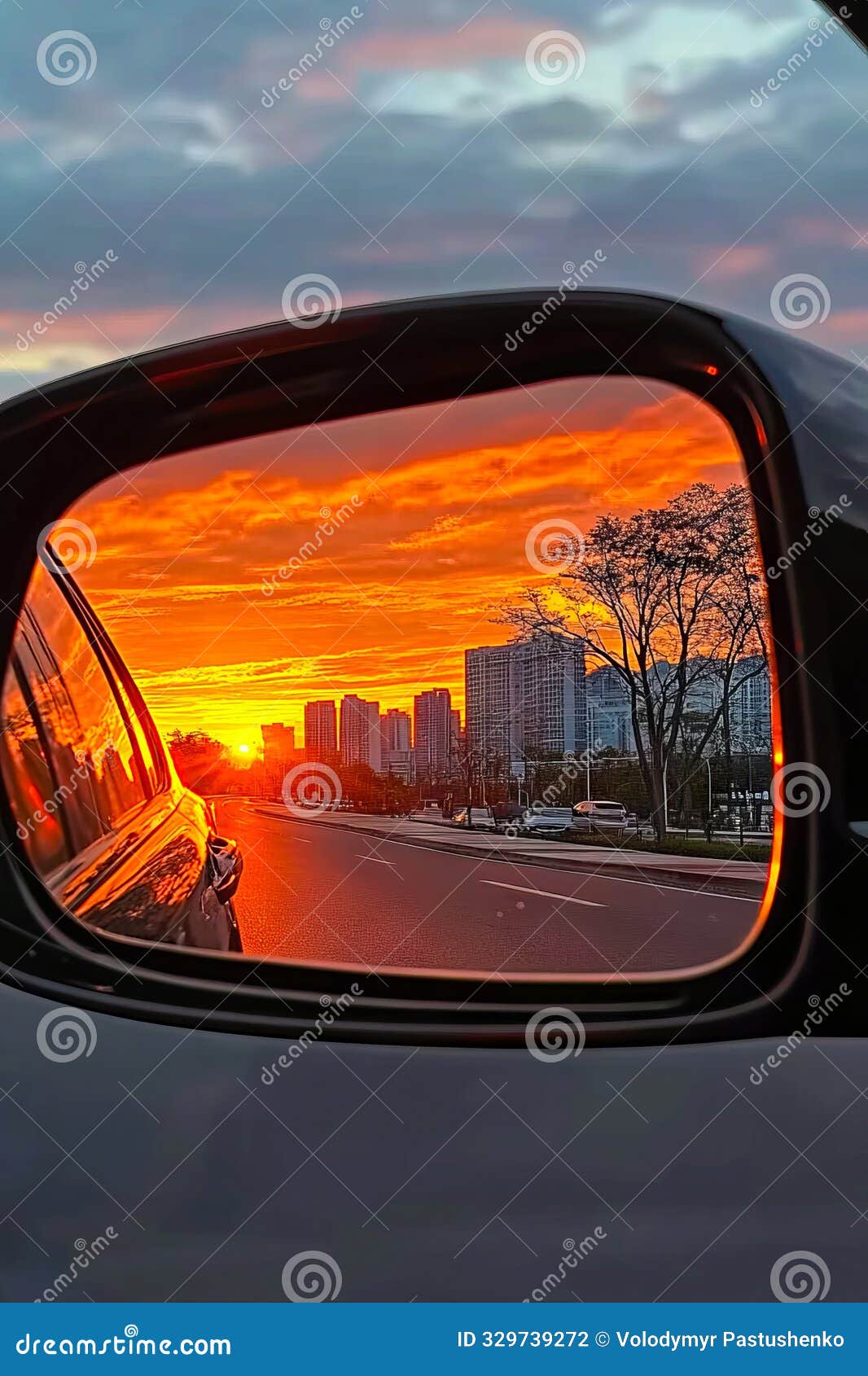 A Car S Side View Mirror with a Sunset in the Background Stock Photo ...