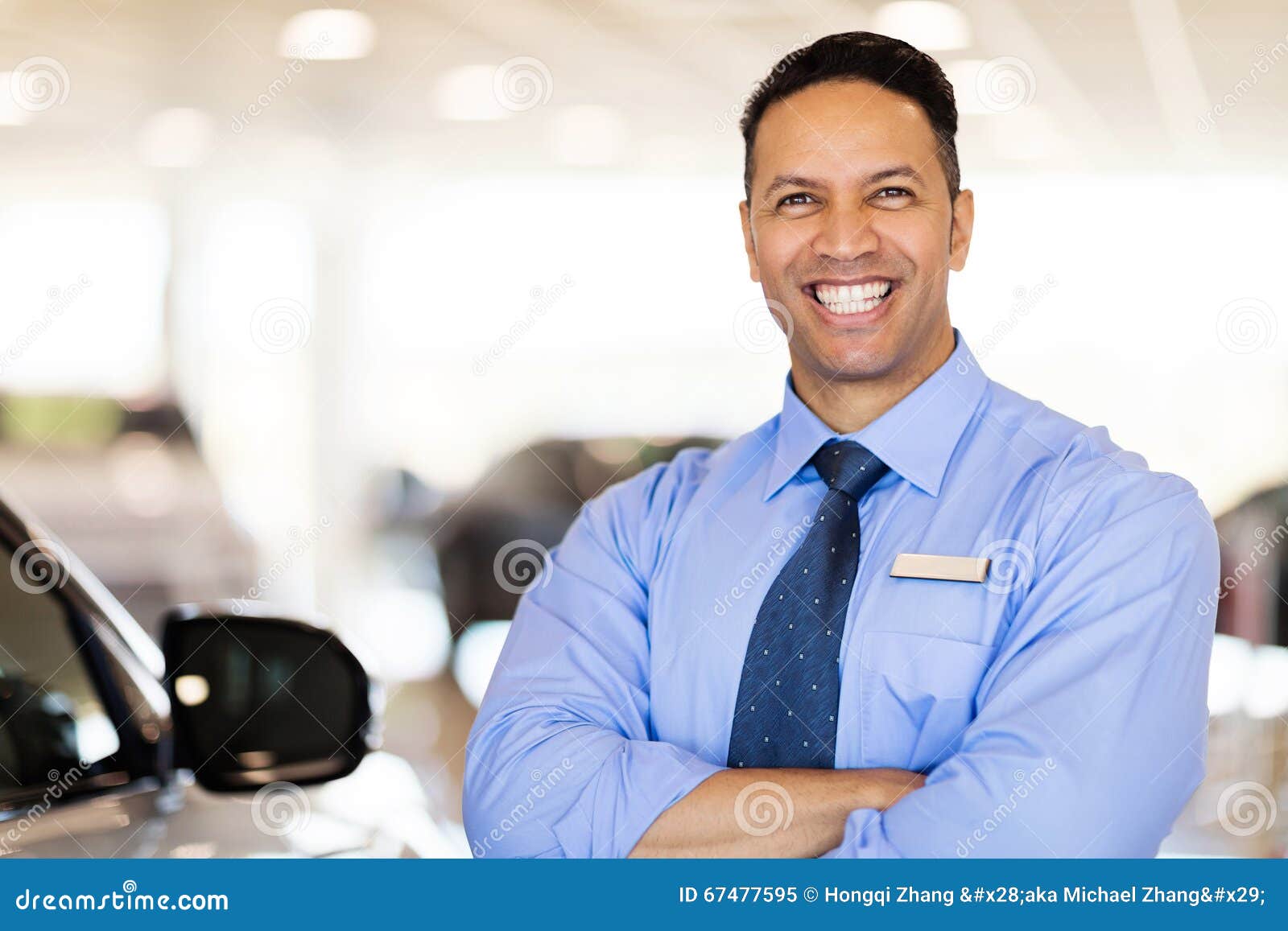 Car salesman in showroom stock image. Image of corporate - 67477595