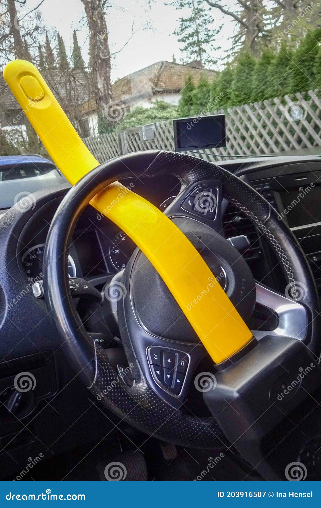 A Car Secured with a Yellow Steeringwheel Lock Stock Image - Image of ...