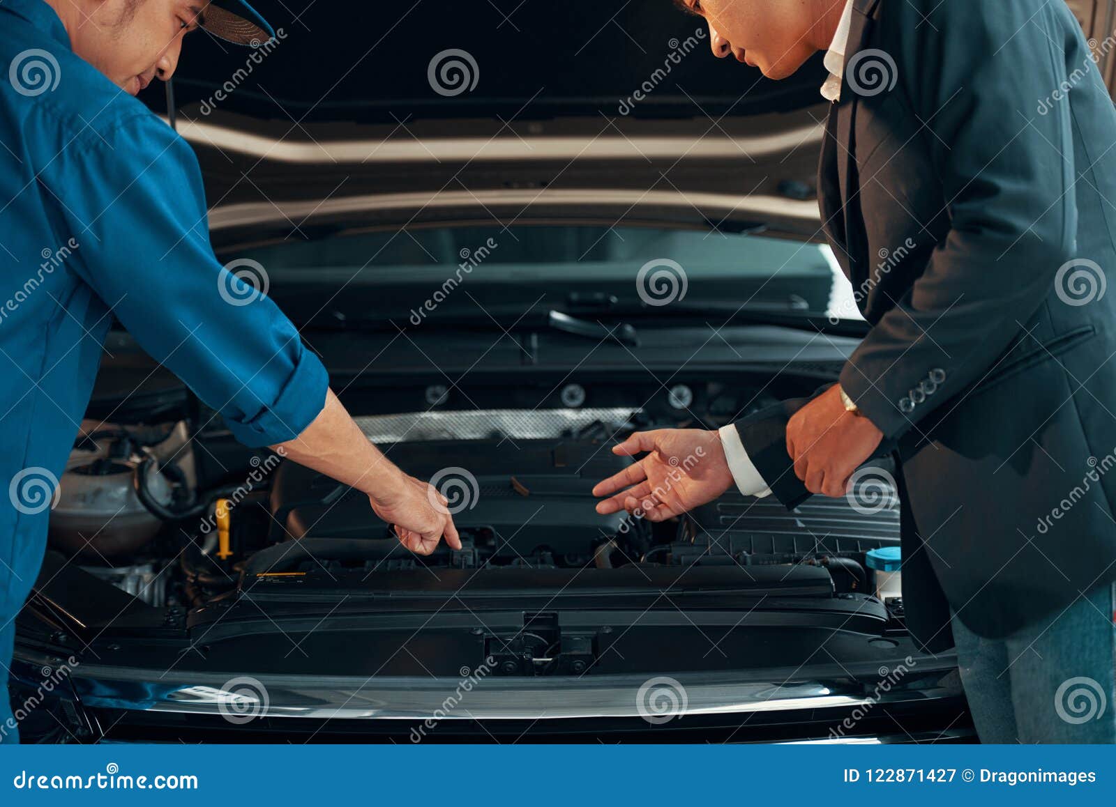 Mechanic helping customer stock image. Image of transportation - 122871427