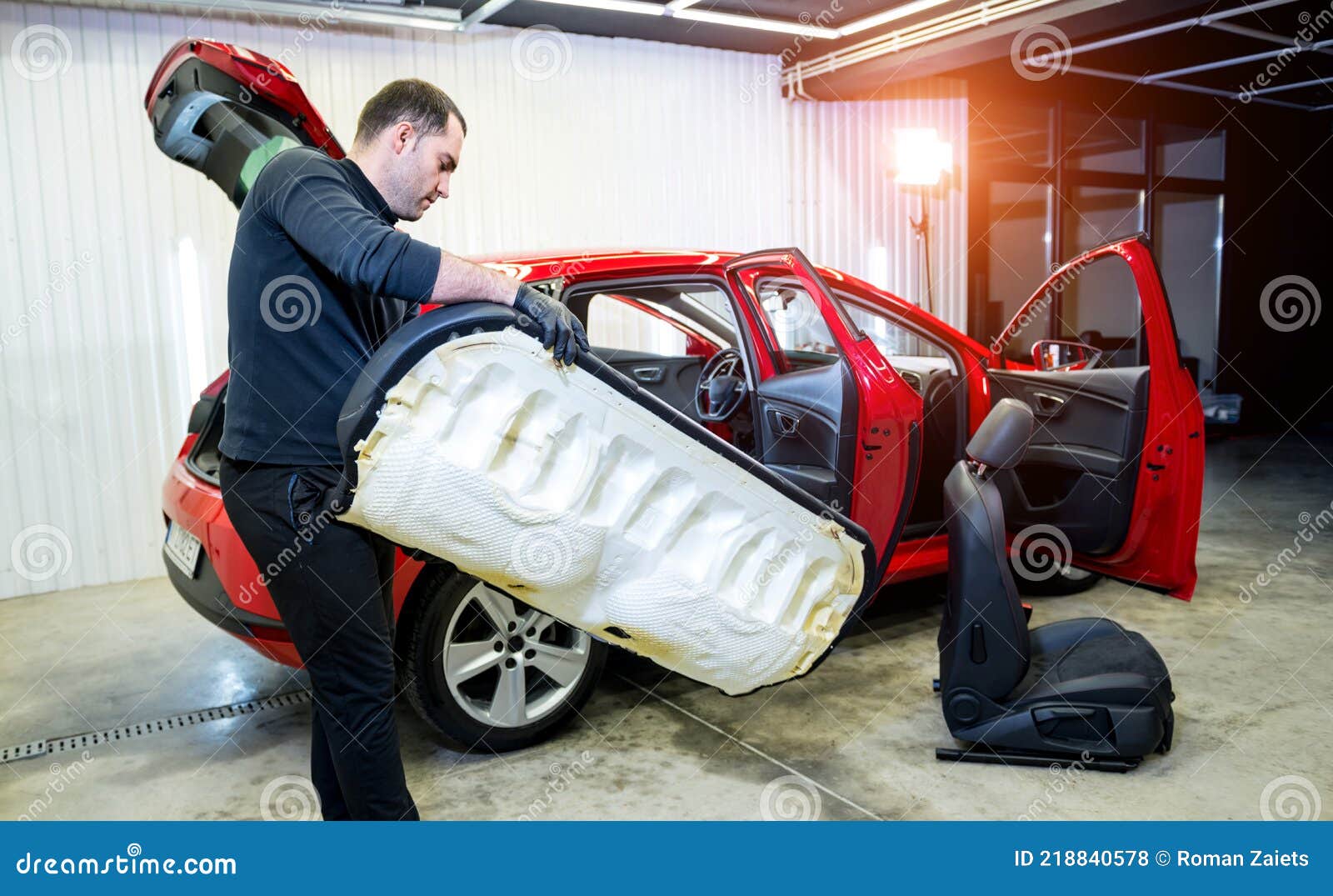 Car Service Worker Disassemble the Interior of the Car Stock Photo ...