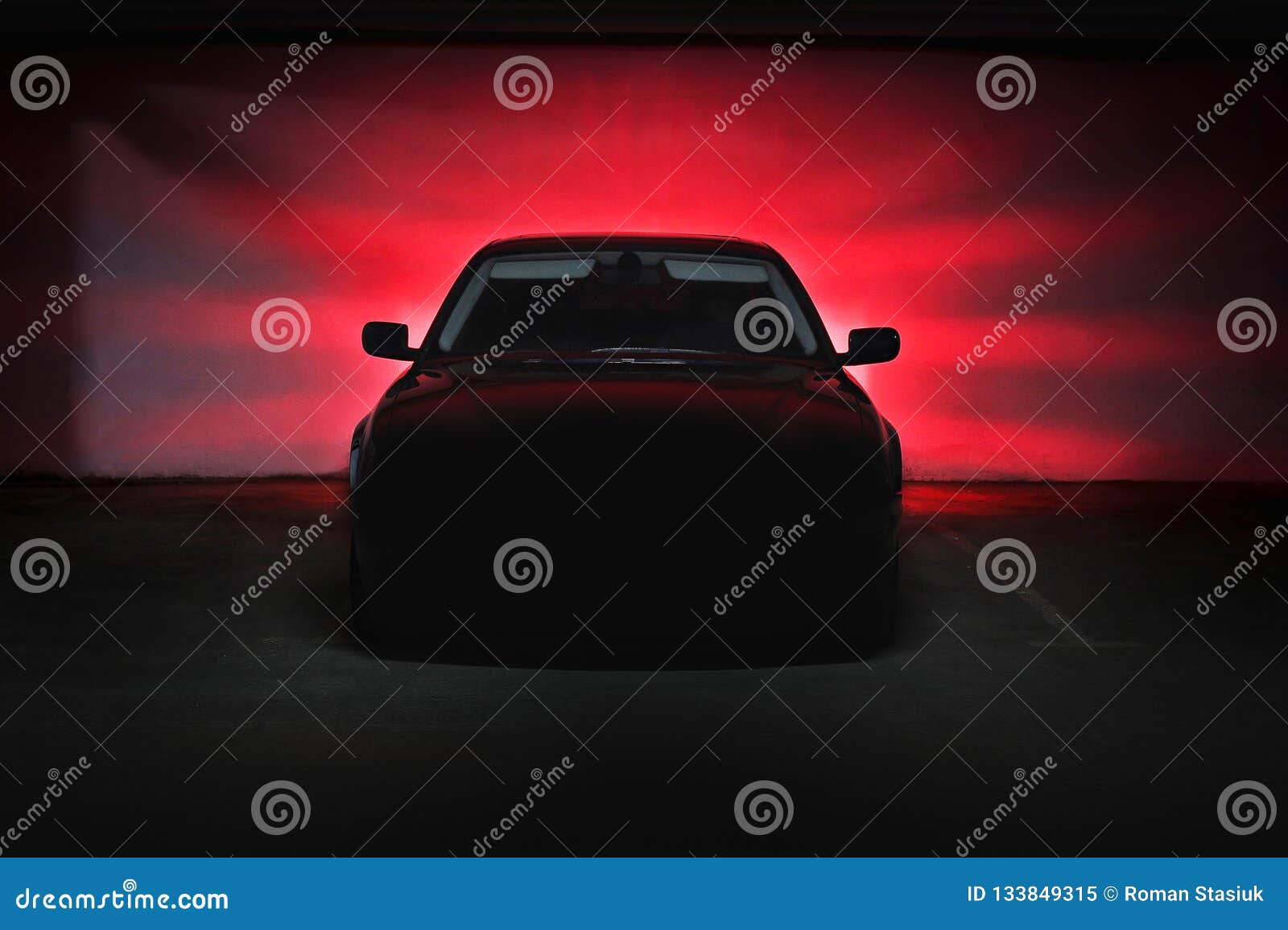The Car in the Shadows with Glowing Lights in Low Light Stock Image ...