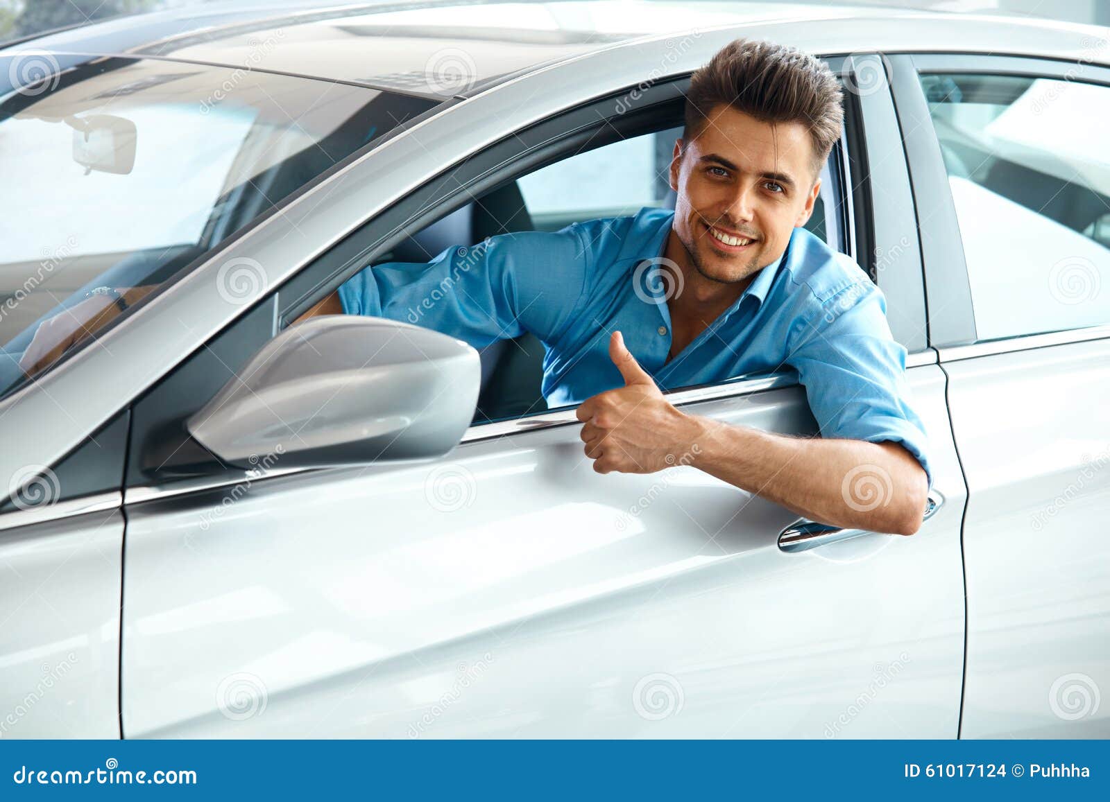 Car Showroom. Happy Customer Inside Car of His Dream. Stock Photo ...