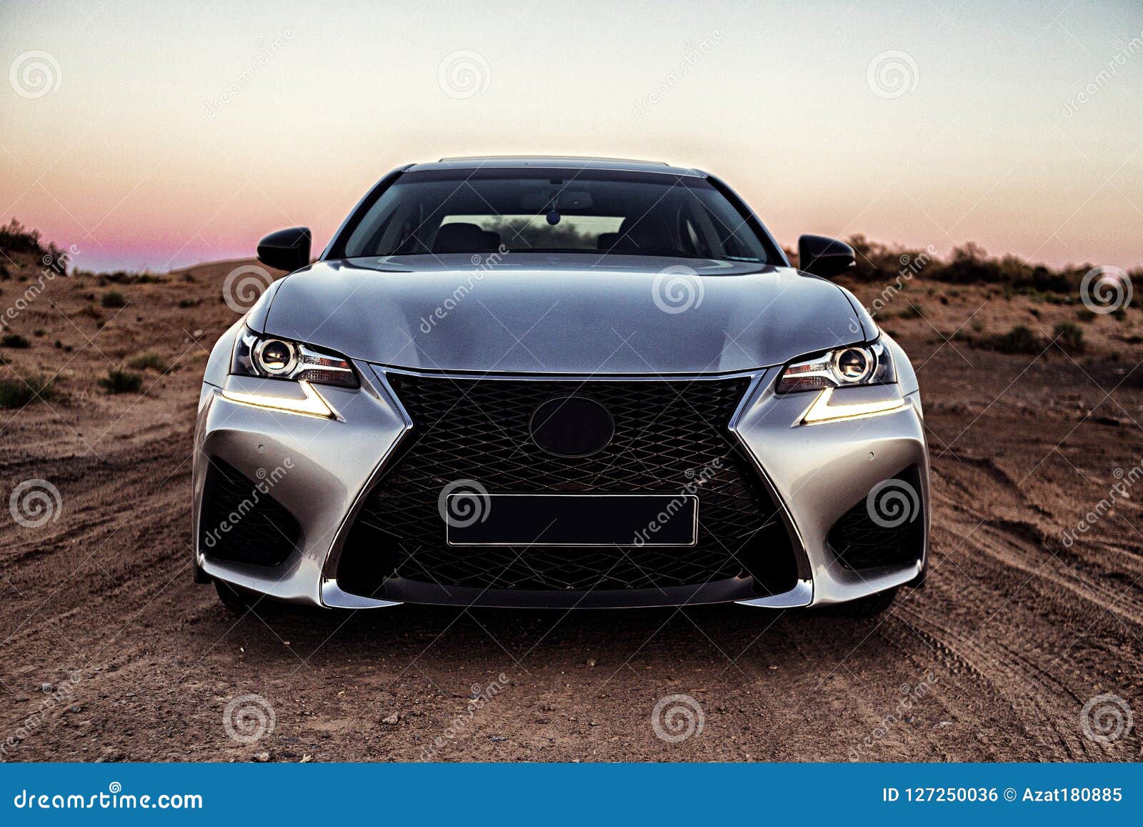A Car in Silver Color without Logos in the Desert in Golden Hour Stock ...