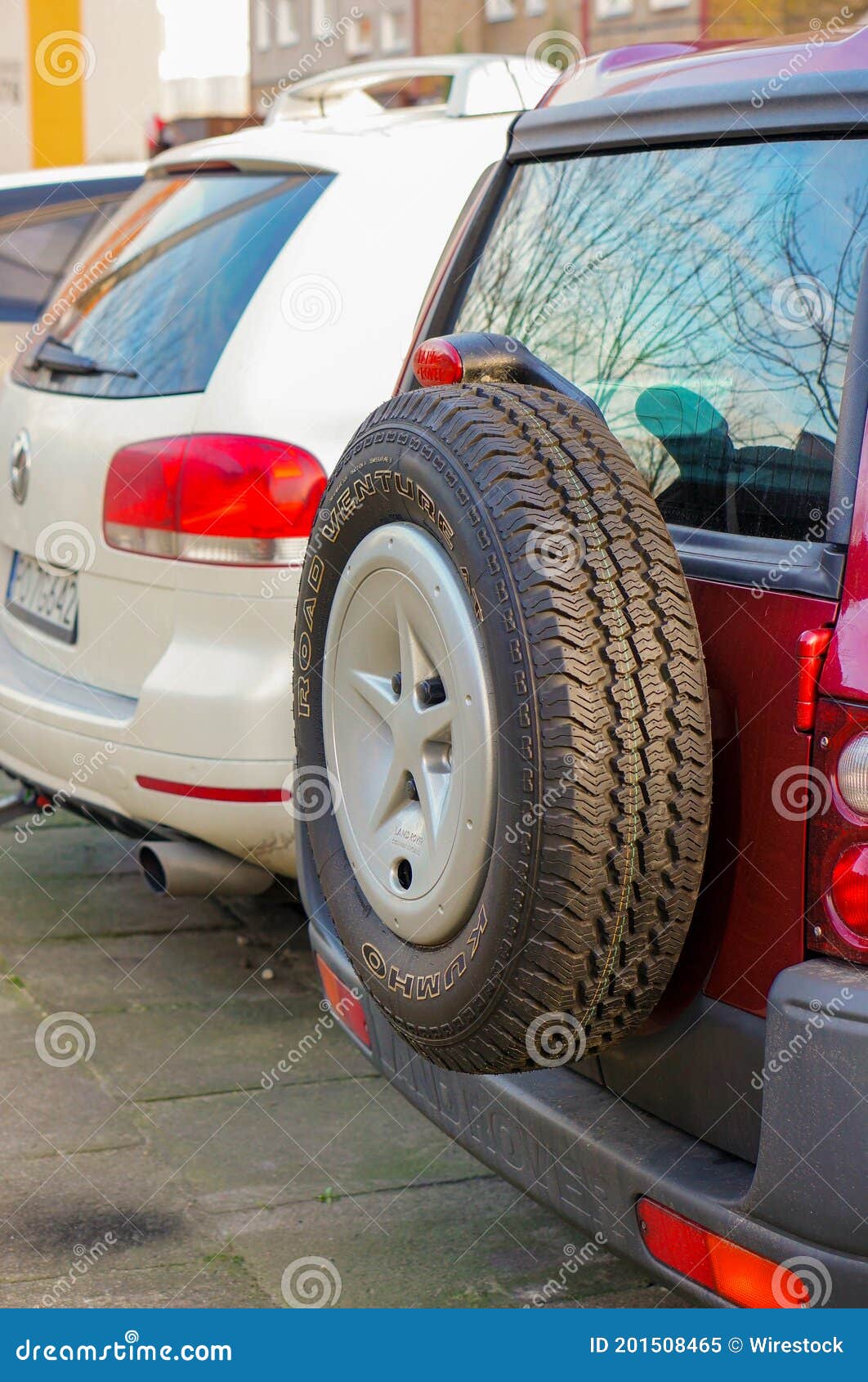 Car Spare Wheel at Parking Lot Editorial Image - Image of parked ...