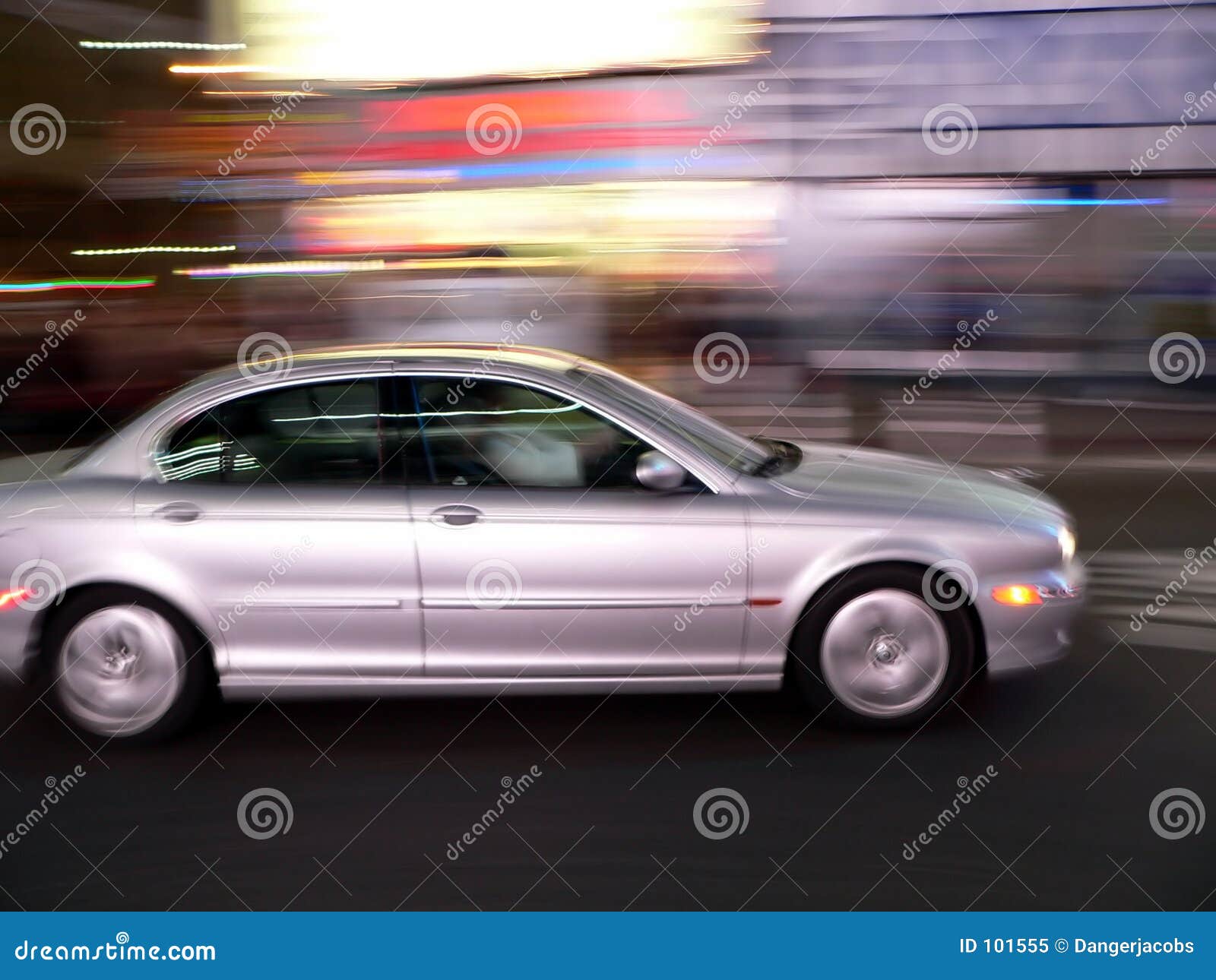 Car speeds down the street stock image. Image of cars, luminous - 101555