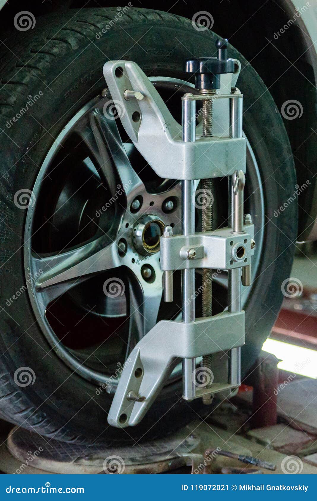 Car on Stand with Sensors on Wheels for Wheels Alignment Camber Check ...