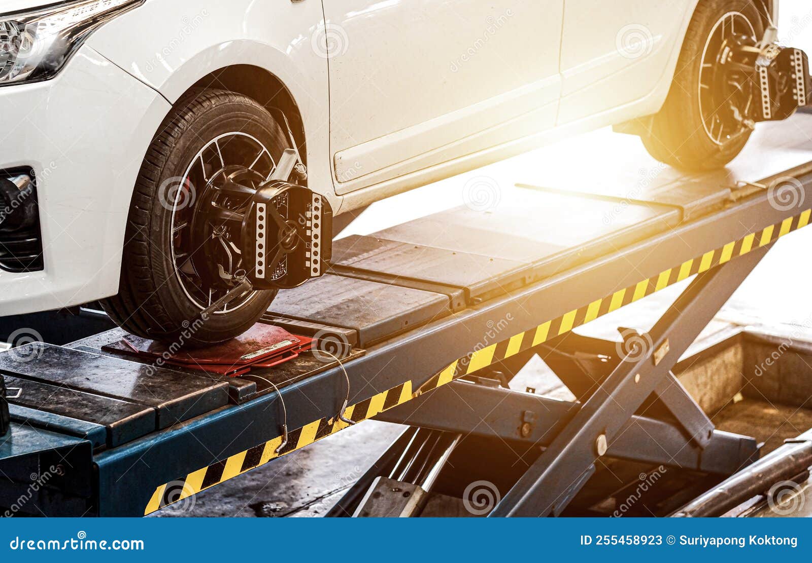 Car on Stand with Sensors on Wheels for Wheels Alignment Camber, Car ...