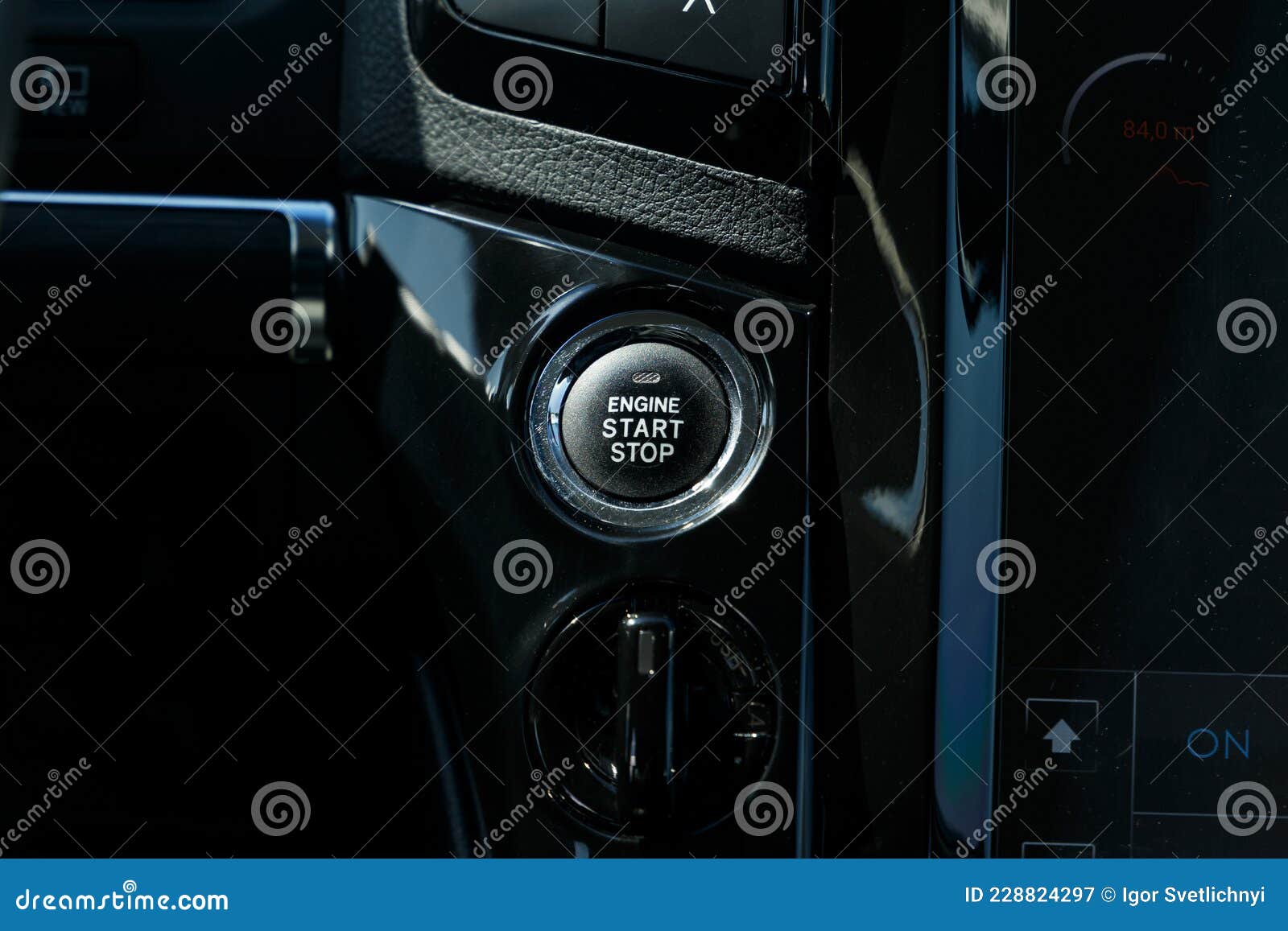 Car Start-Stop Engine Button of a Modern Car in the Interior of the ...